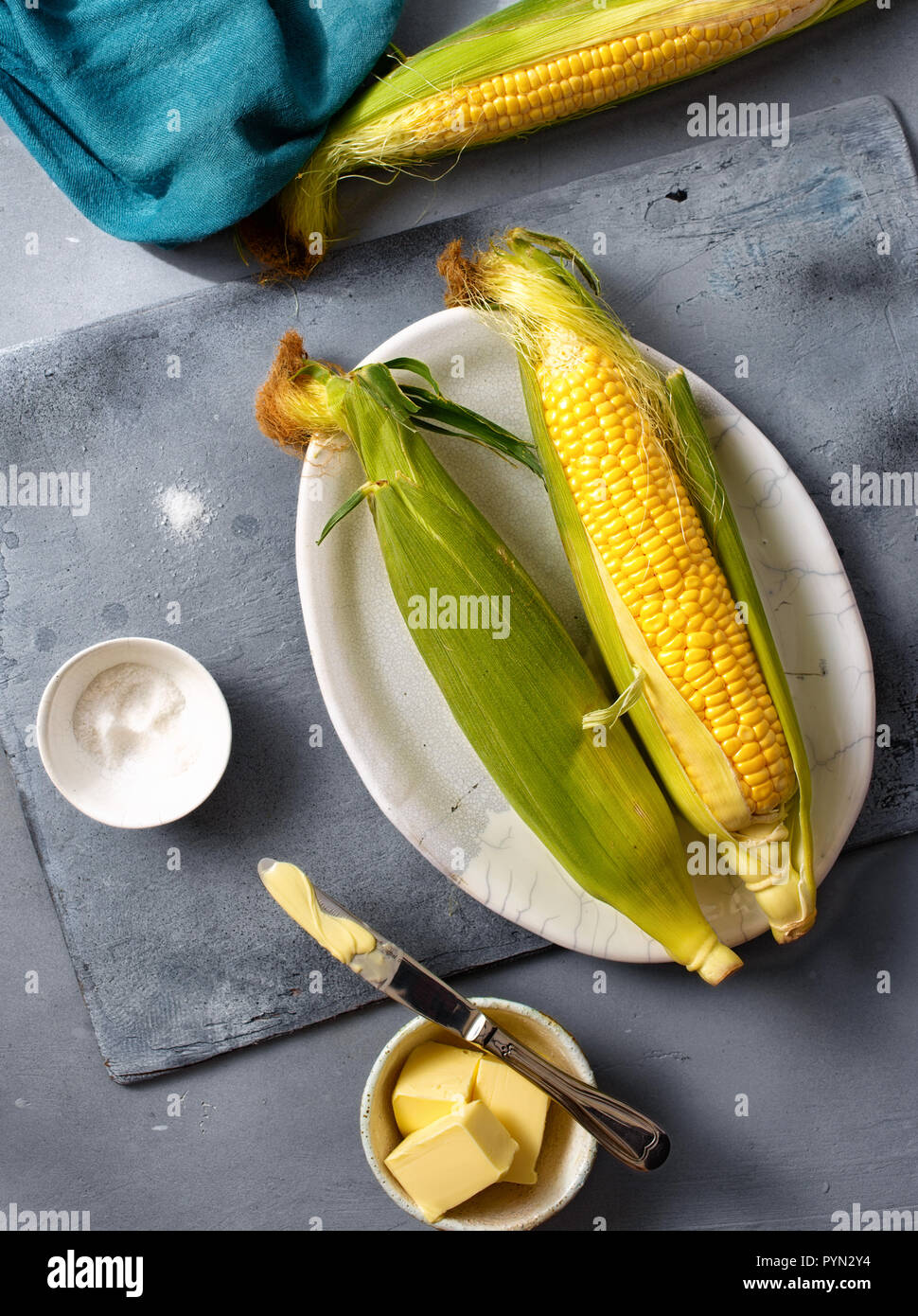 Raw sweet corn with ingredients for cooking top view Stock Photo - Alamy