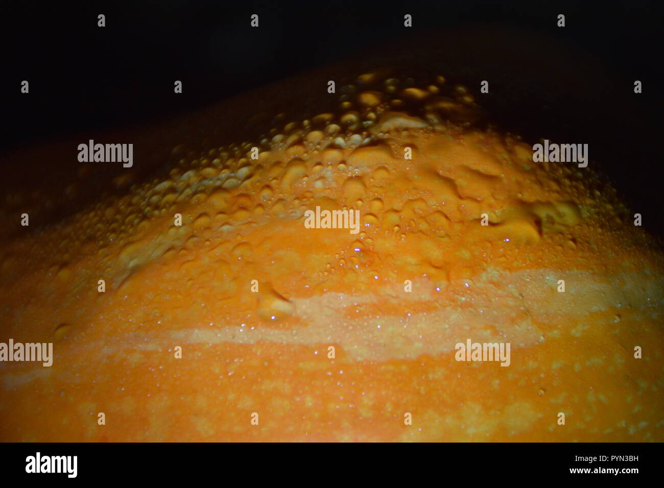Closeup of an orange pumpkin with waterdrops Stock Photo - Alamy