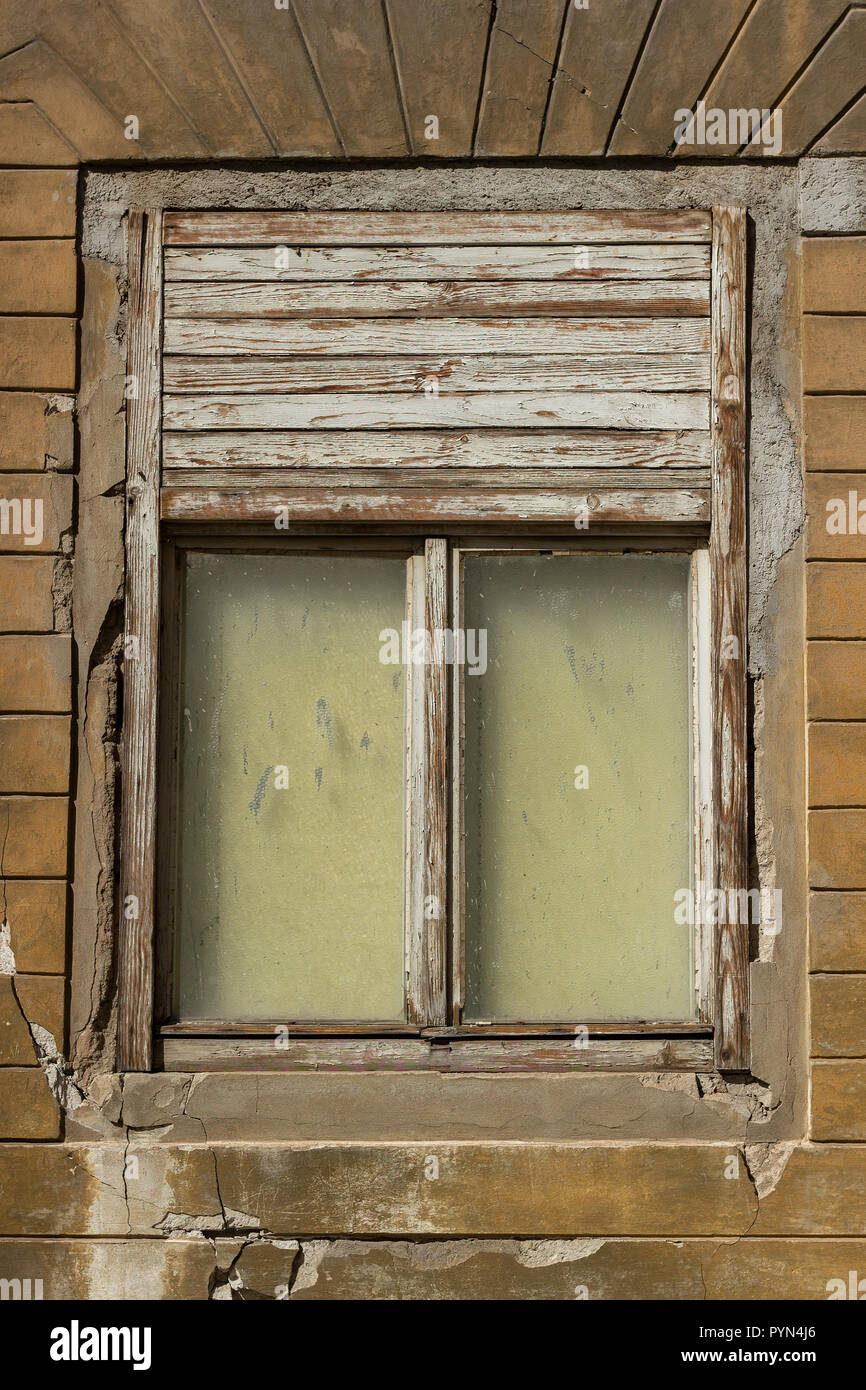 Old wooden window with wooden blinds on an abandoned wooden house Stock ...