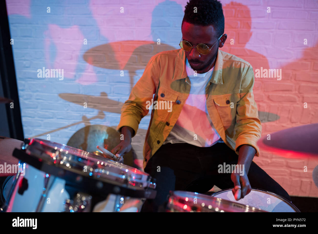 African-American Man Playing Drums Stock Photo - Alamy