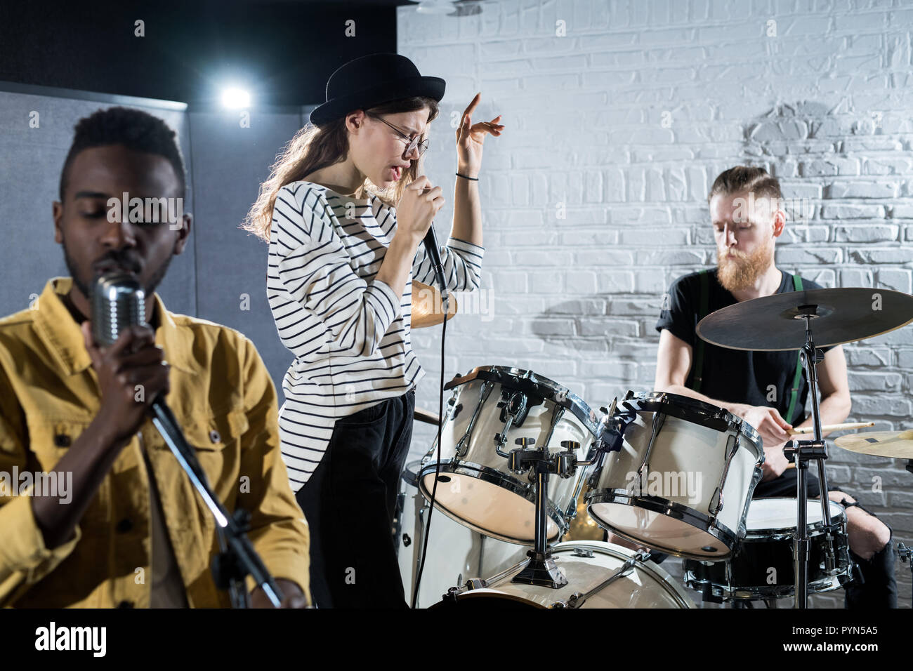 Band Performing on Stage Stock Photo - Alamy