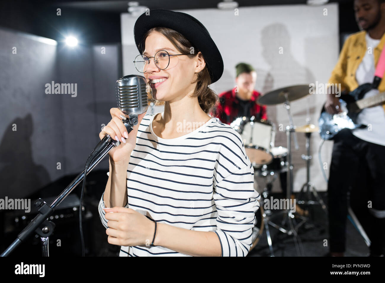 Female singer performing on studio hi-res stock photography and images ...