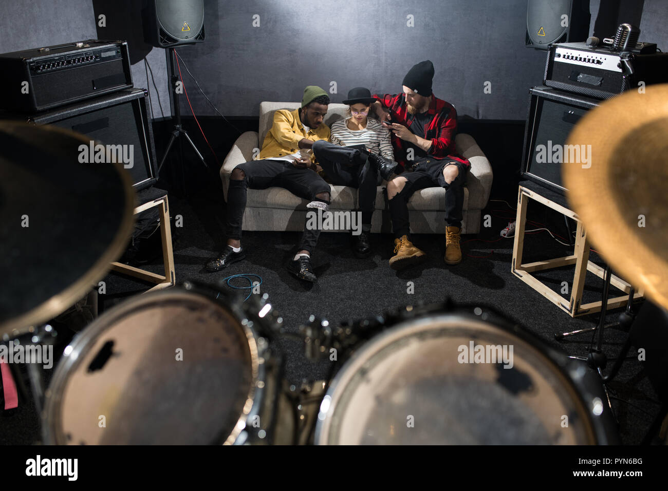 Young People Chilling in Studio Stock Photo - Alamy