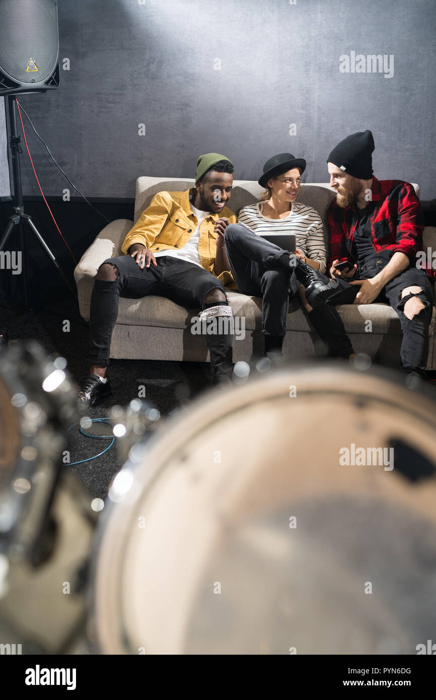 Three Young People Chilling in Studio Stock Photo - Alamy