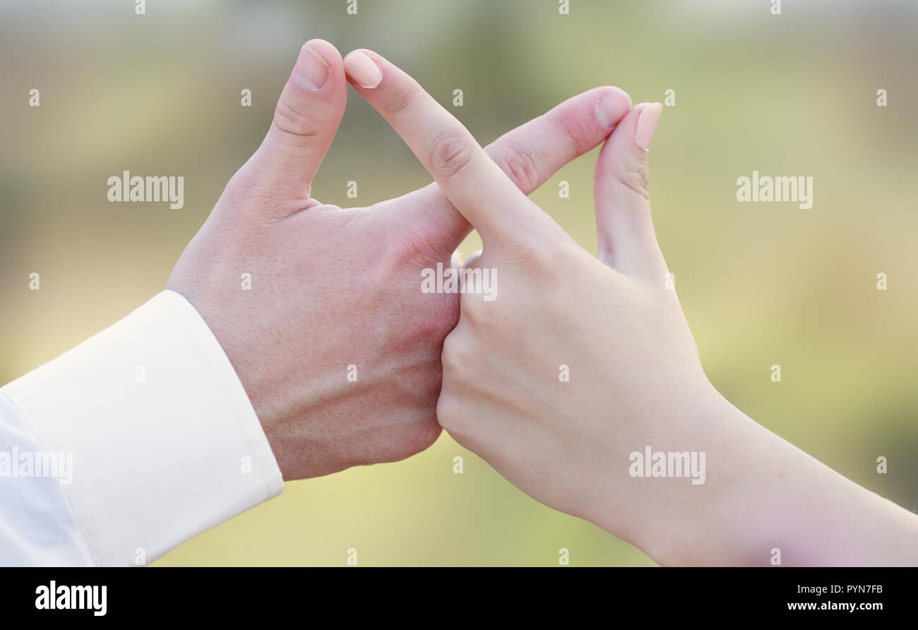Infinity symbol hands hi-res stock photography and images - Alamy
