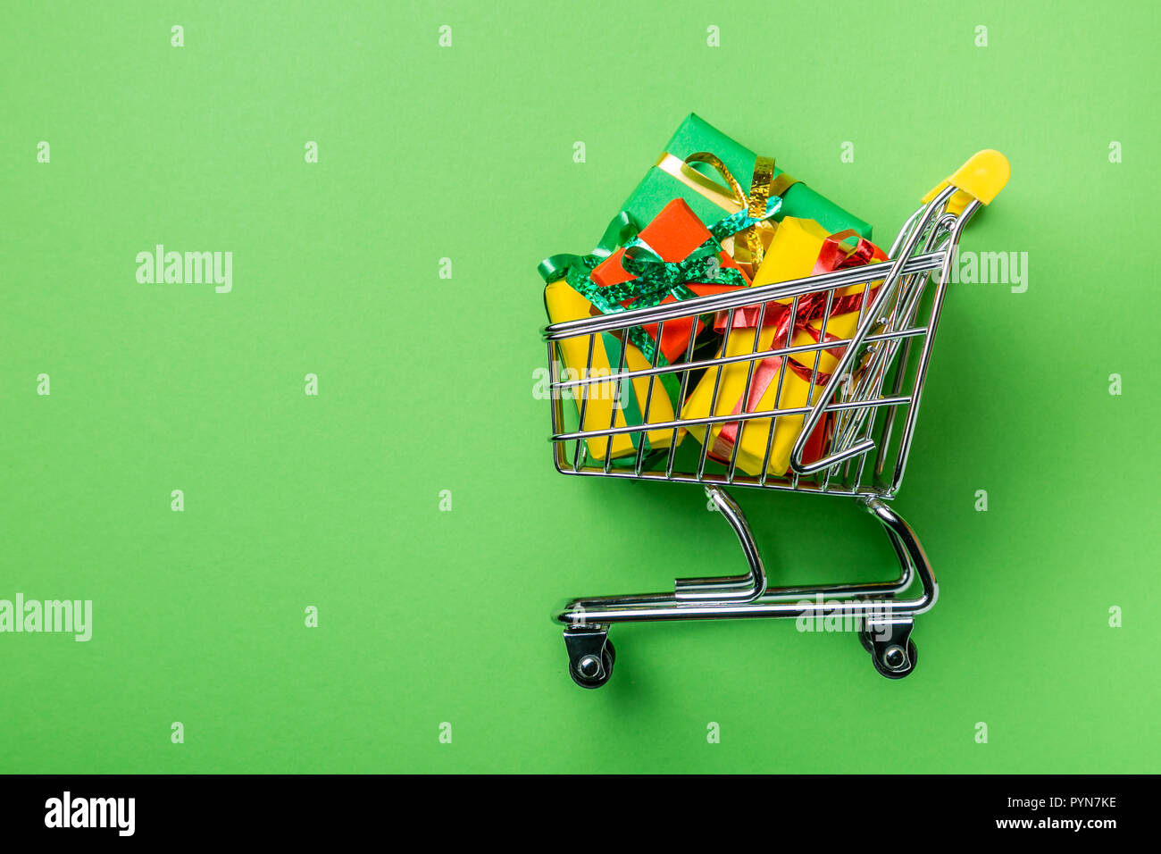 Online shopping concept - trolley cart full of presents Stock Photo - Alamy