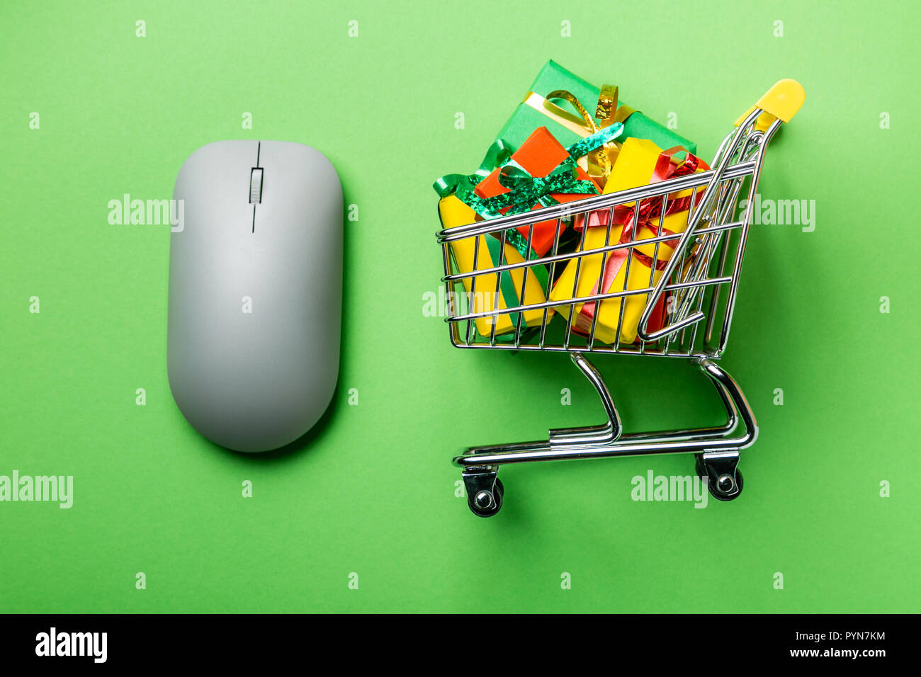Online shopping concept - trolley cart full of presents Stock Photo - Alamy