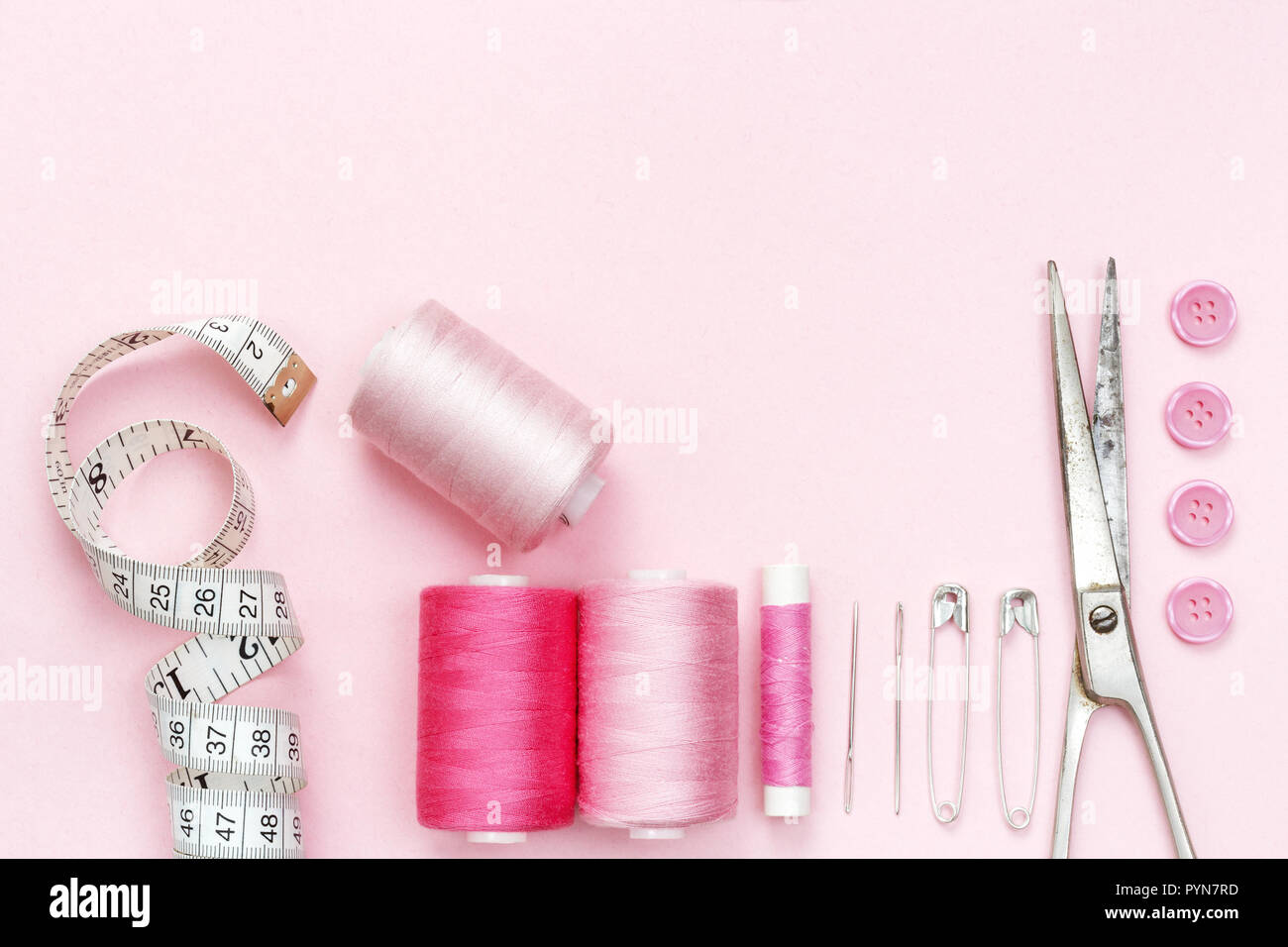 Shade of pink. Equipment needed for sewing Stock Photo - Alamy