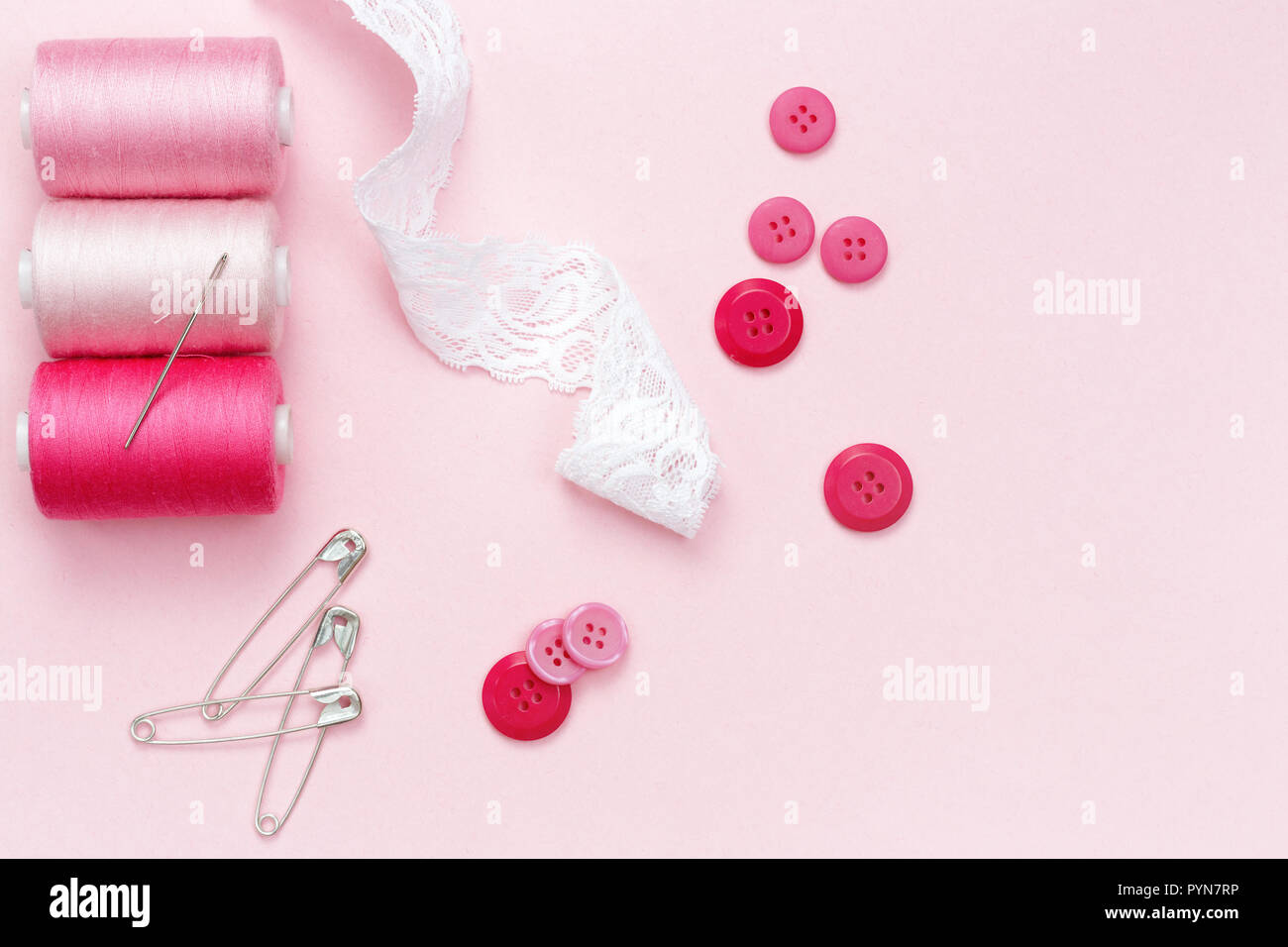 Shades of pink. Sewing equipment and material for fabric Stock Photo ...