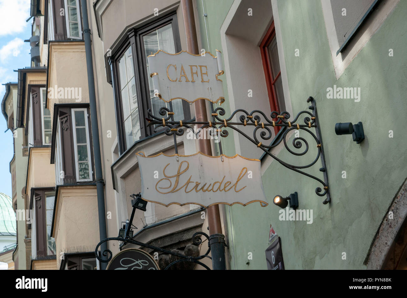Coffee and Strudel shop sign in Hofgasse Street Innsbruck, Austria ...