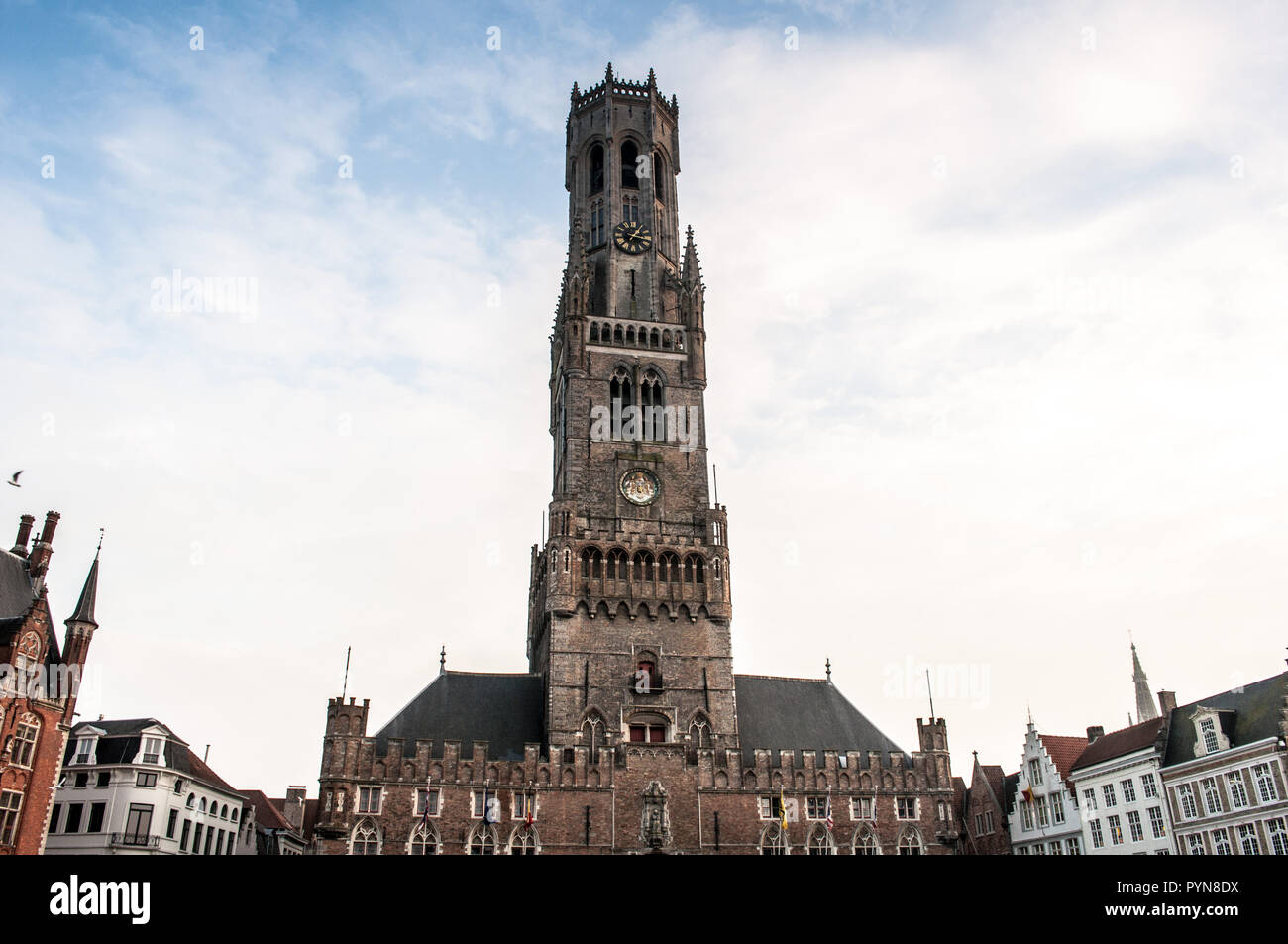 The gothic medieval Flemish Belfry of Bruges. The clock tower on the ...