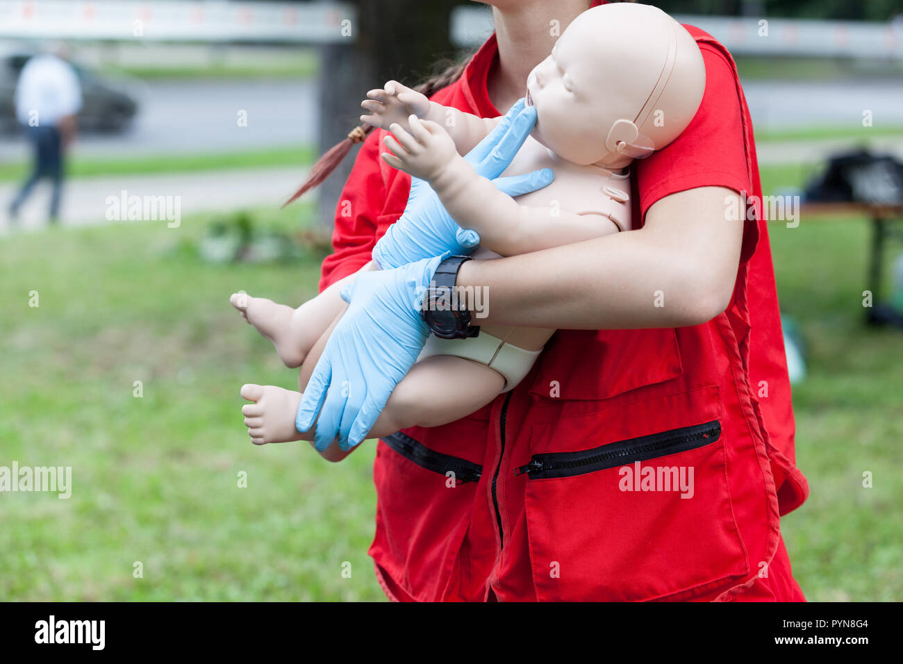 First aid training, demonstration of lifesaving procedures on an infant ...