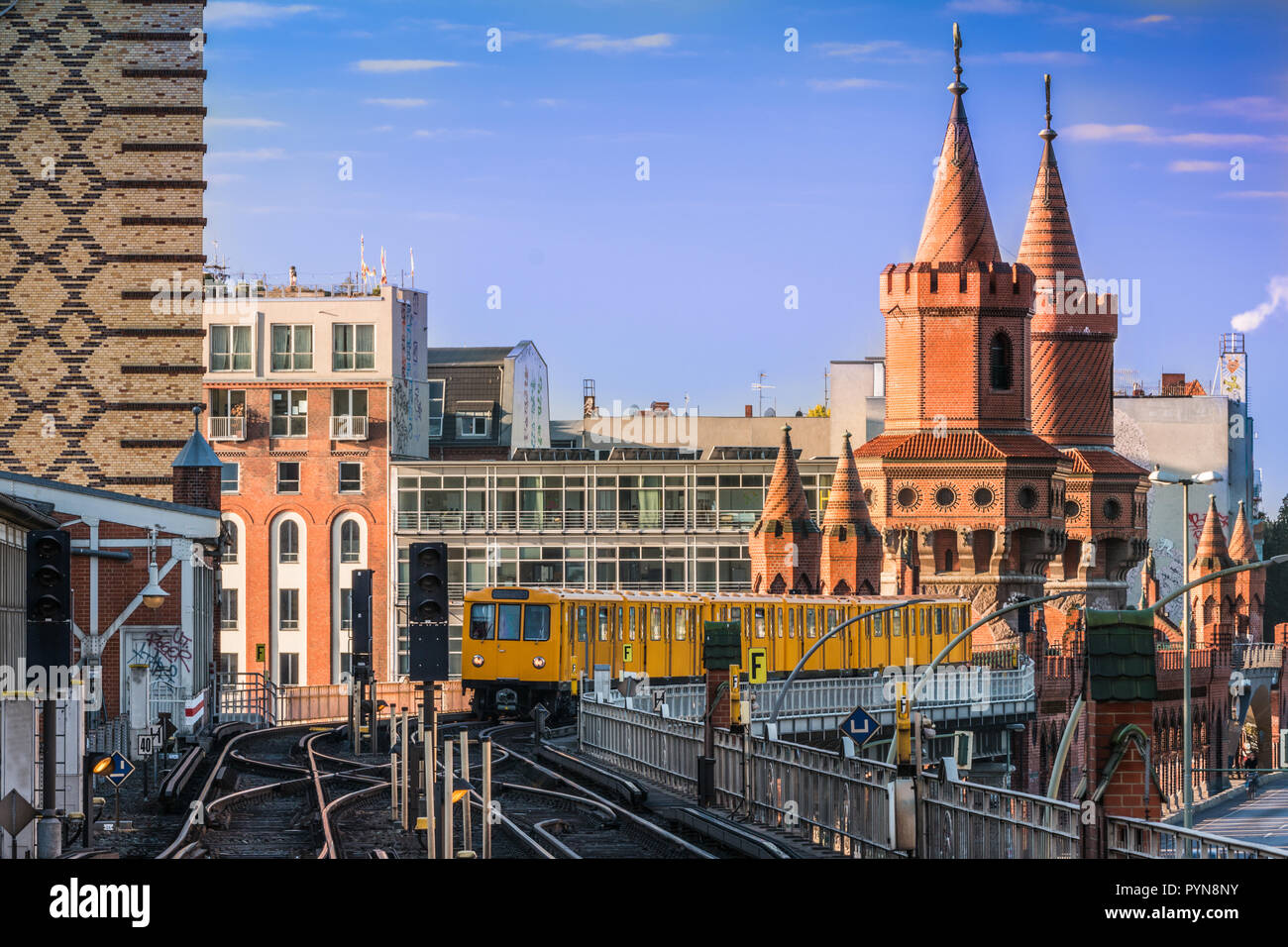Subway over bridge in Berlin by sunrise Stock Photo - Alamy