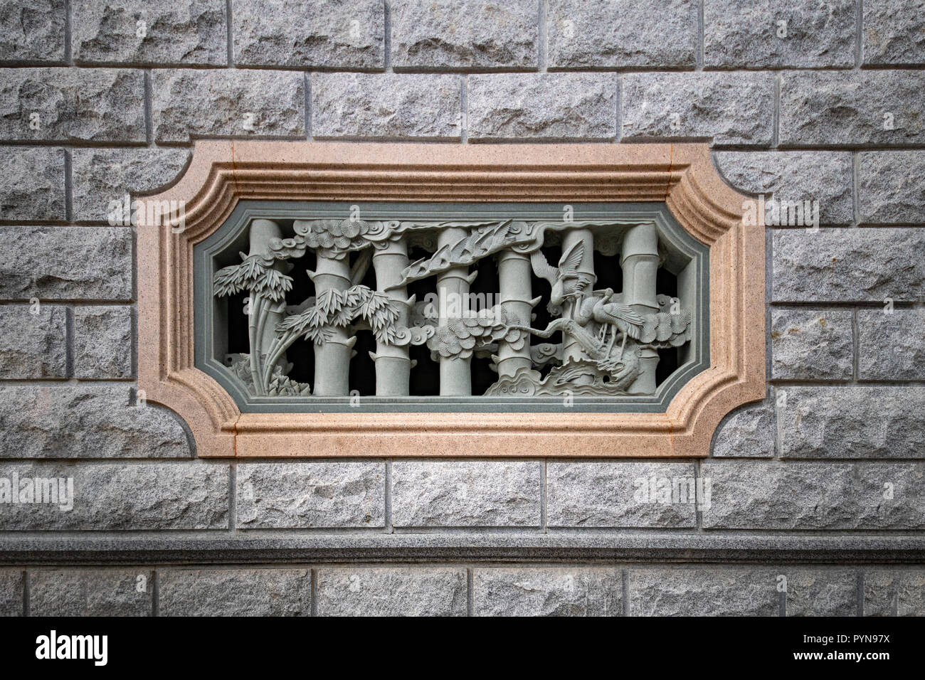 Beautiful bas-relief stone window frames in a big g Stock Photo - Alamy