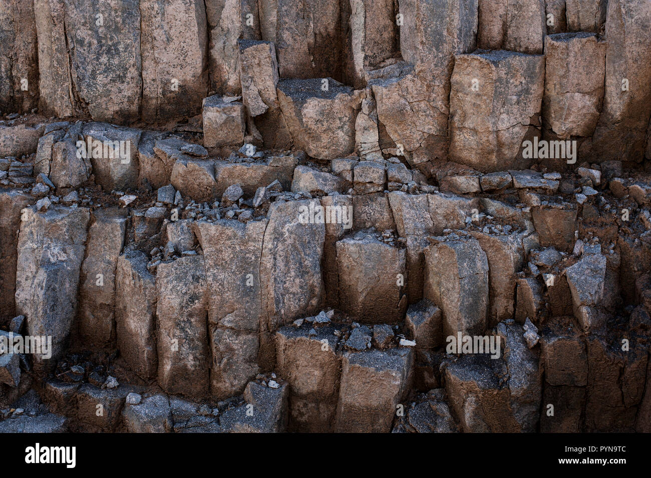 Sedementary Rock Wall Quarry with rock patterns and shapes Stock Photo ...