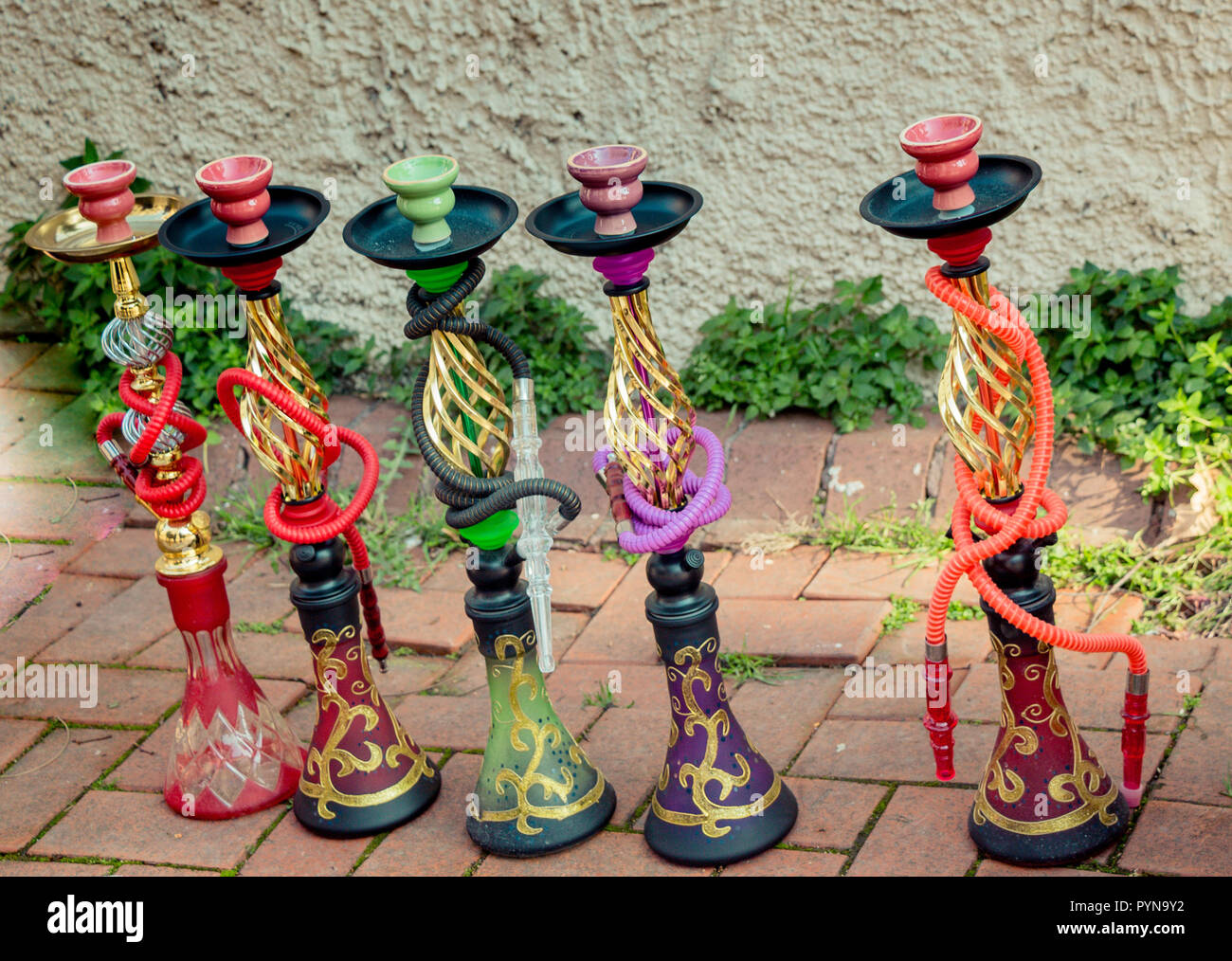 Set of Colorful glass smoke hookah in view Stock Photo - Alamy