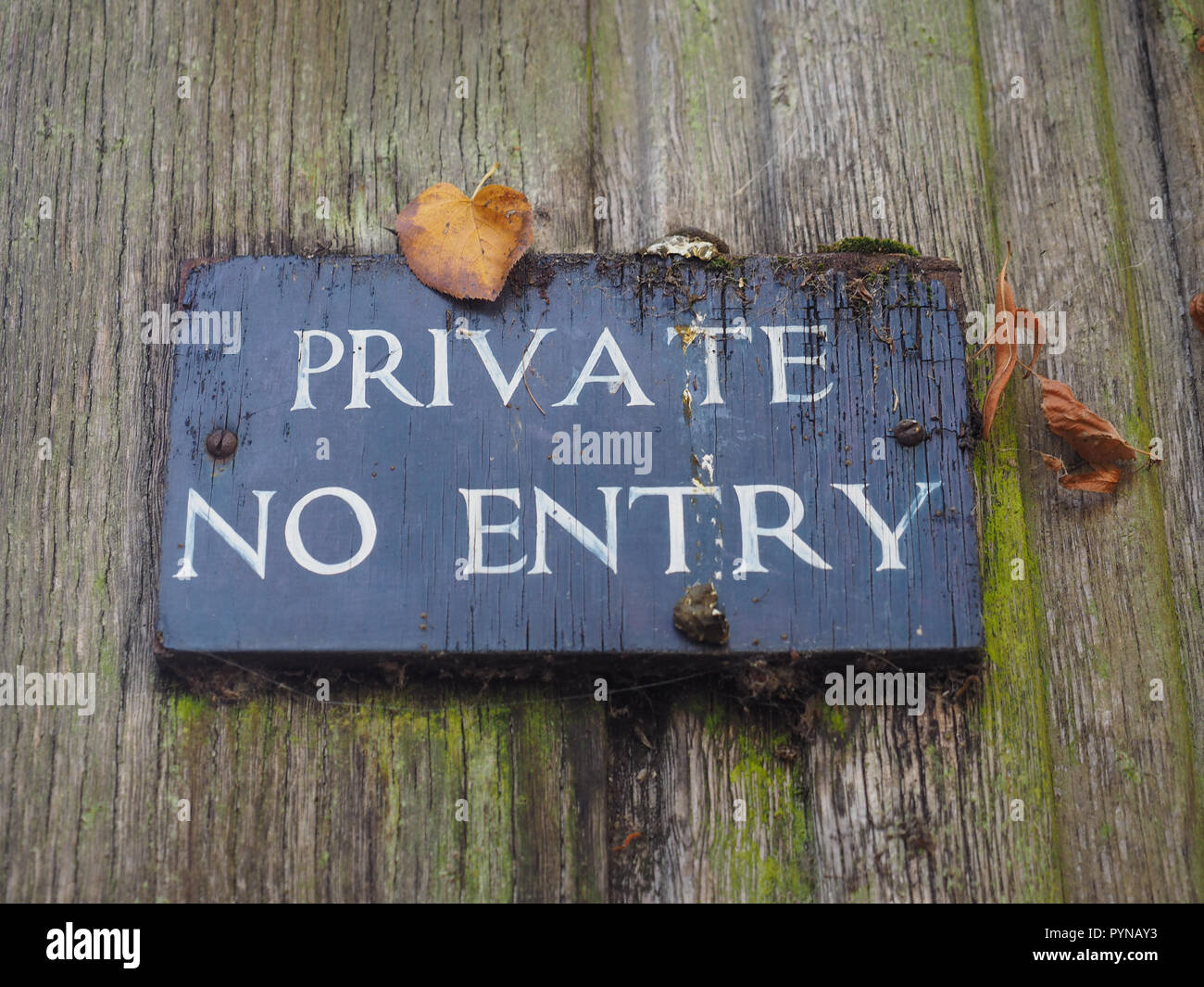 private no entry warning sign on a wooden door Stock Photo - Alamy