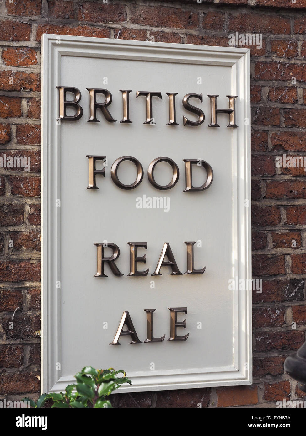 british food real ale sign on a pub wall Stock Photo - Alamy