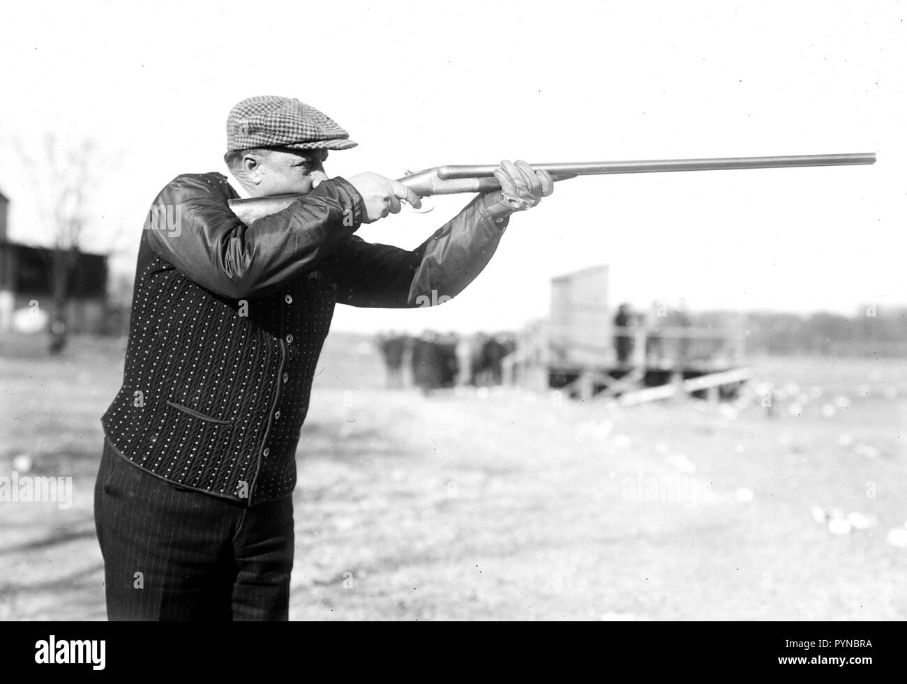 Early 1900s man shooting gun hi-res stock photography and images - Alamy