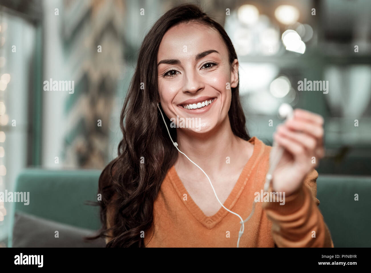 Beautiful young female looking straight at camera Stock Photo - Alamy