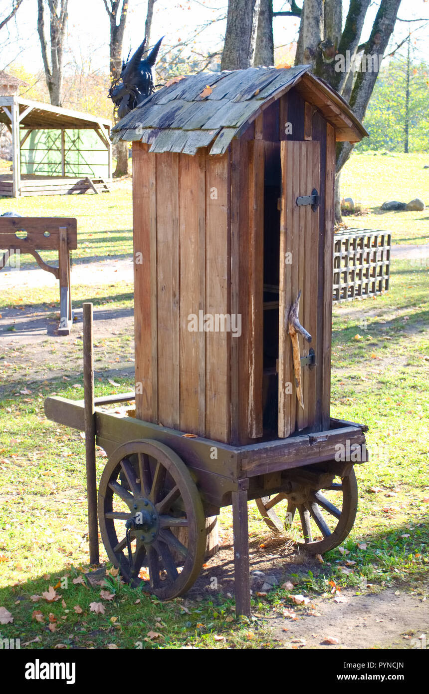 Beautiful ancient traditional wooden smoker fish and meat in a medieval ...
