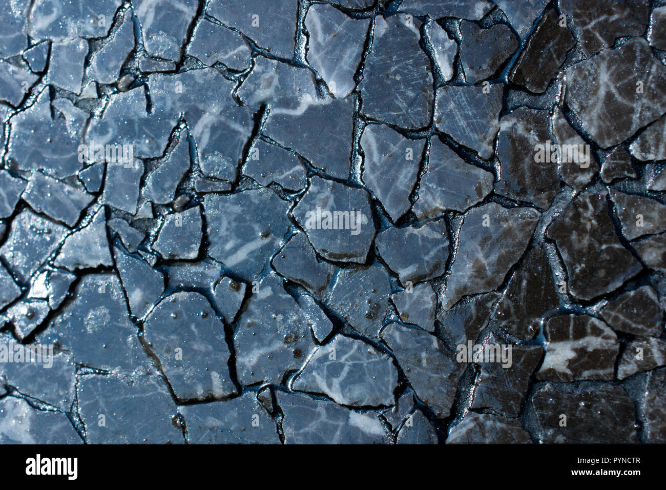 Decorative stone background built of little stones Stock Photo - Alamy