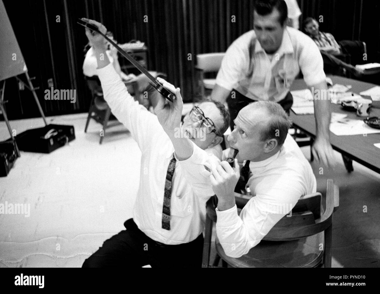 (23 Sept. 1966) --- Astronauts Charles Conrad Jr. (with pipe) and ...