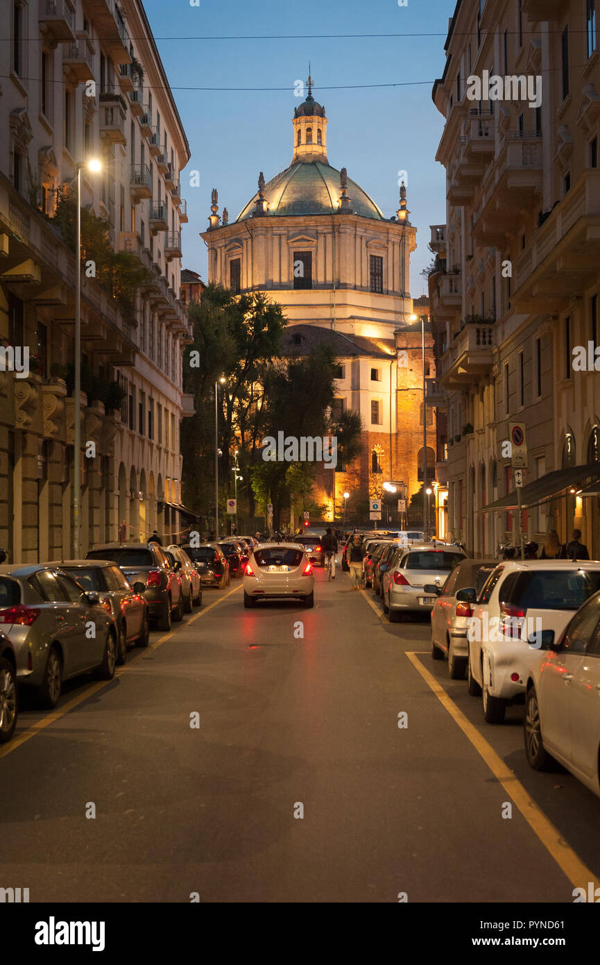 Street scene Milan, Italy, with the Basilica San Lorenzo towering above ...
