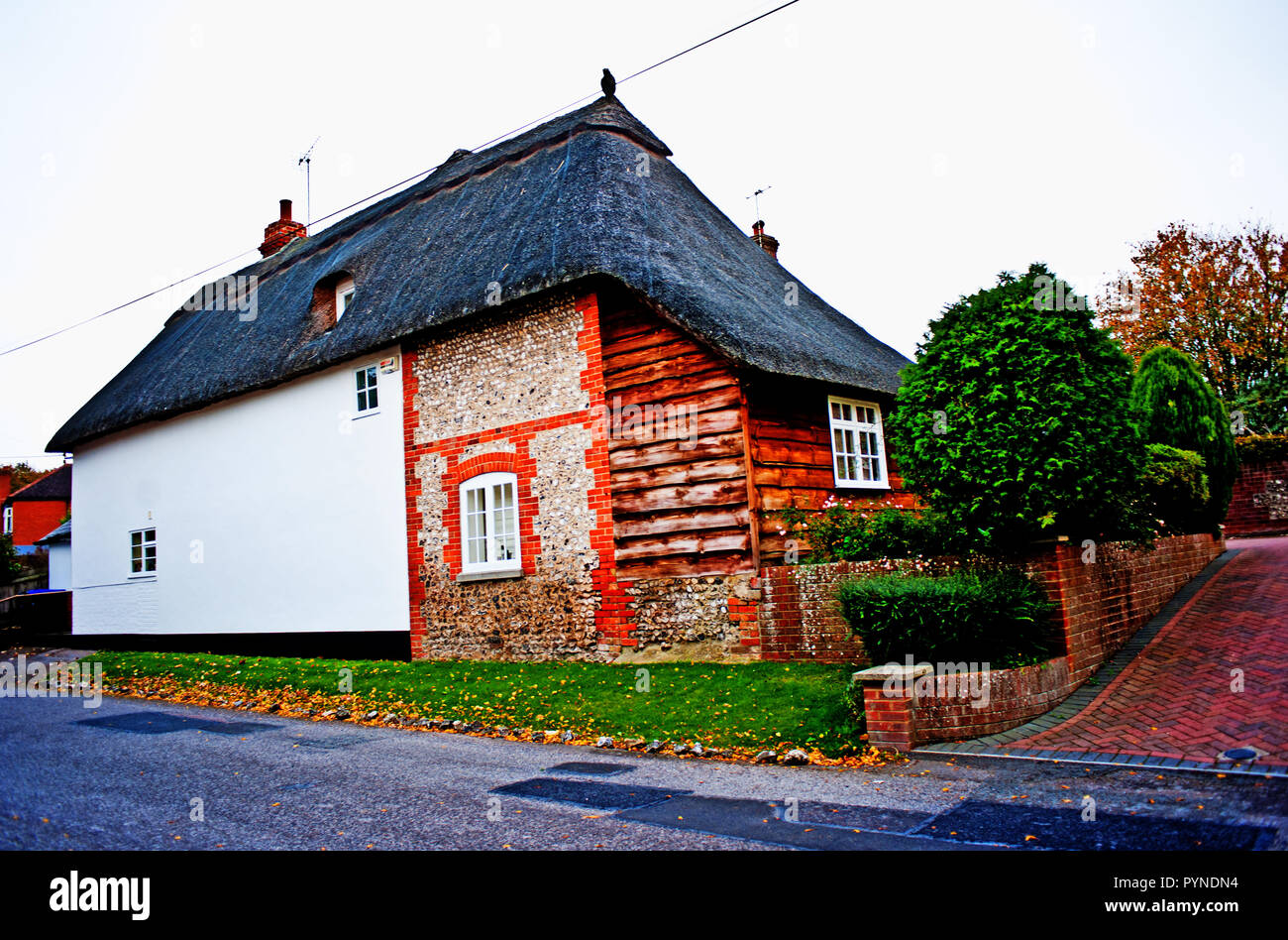 Brick and Flint Thatched Cottage, Bulford, Wiltshire, England Stock ...