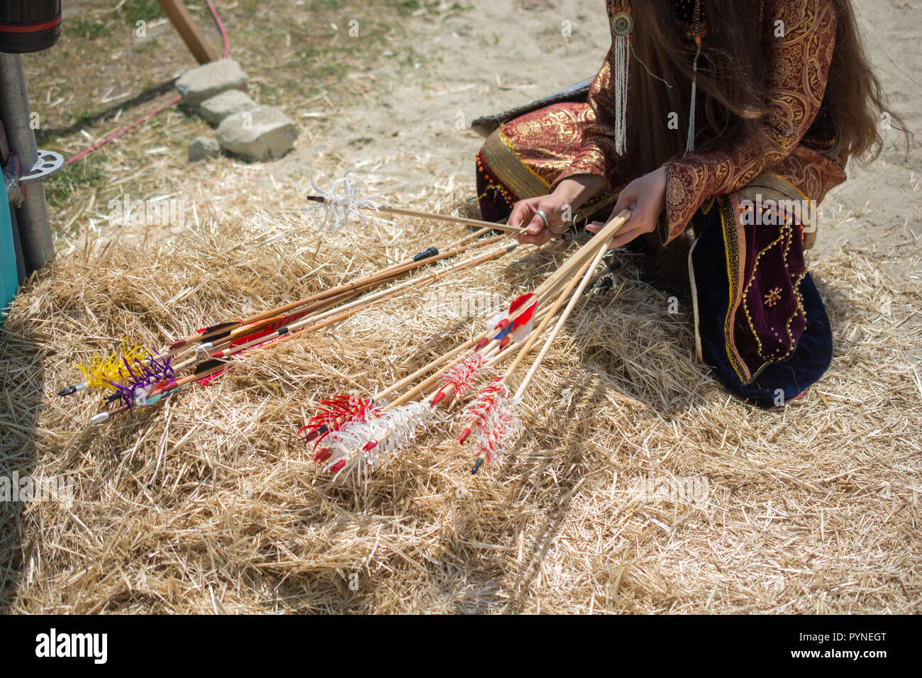 Arrow in hand as rprojectile weapon system archery Stock Photo - Alamy