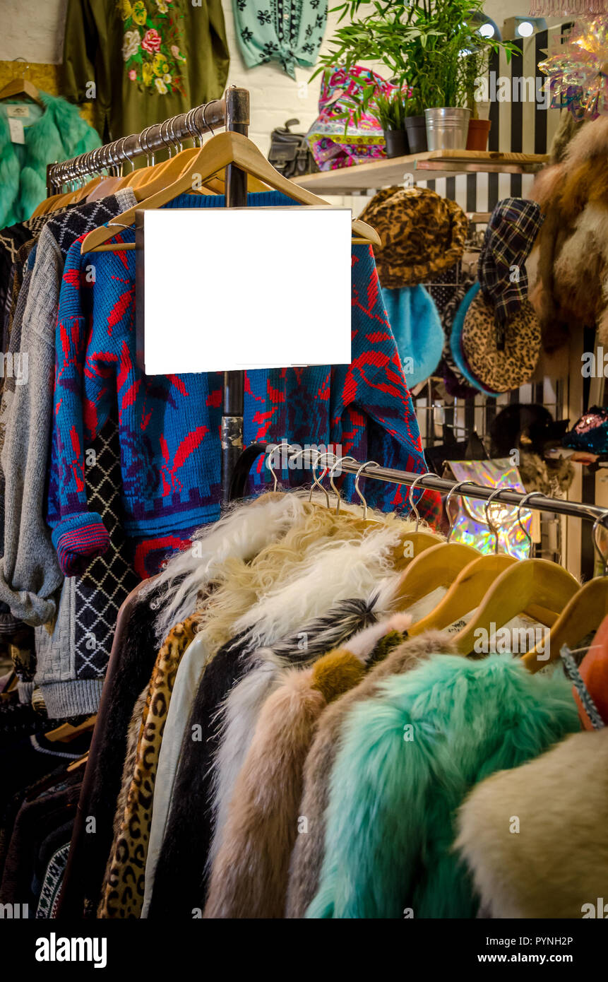 Second hand clothing for sale Stock Photo - Alamy