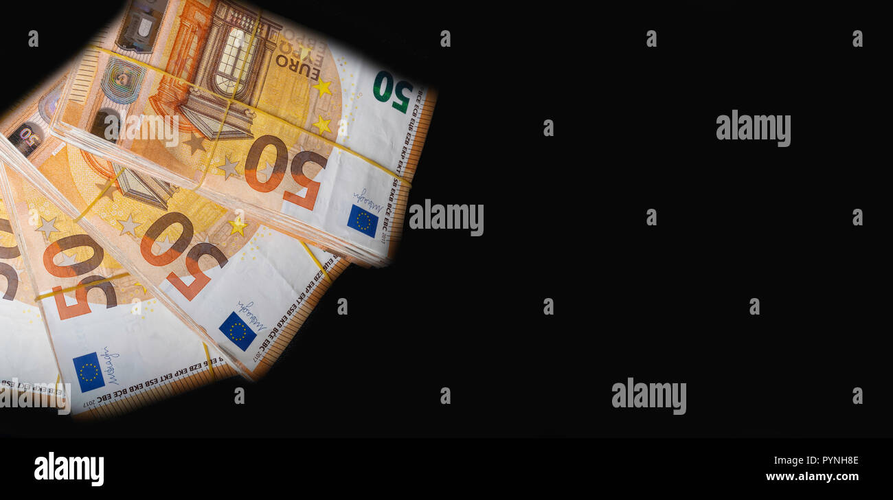 Pile of 50 real euro notes 50-euro banknotes under rubber band isolated ...