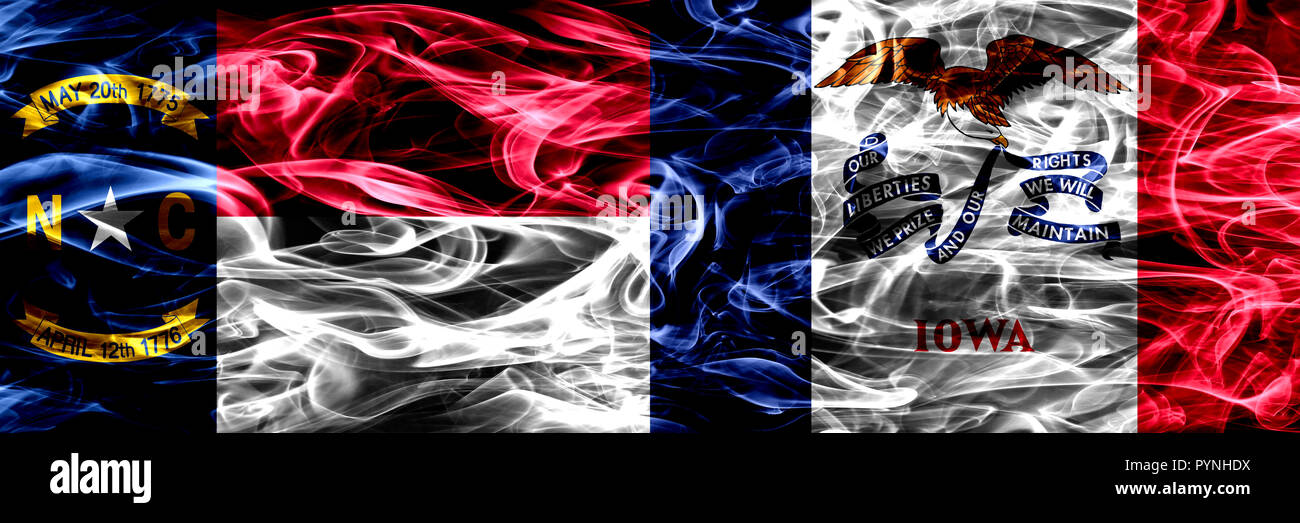 North Carolina vs Iowa colorful concept smoke flags placed side by side ...