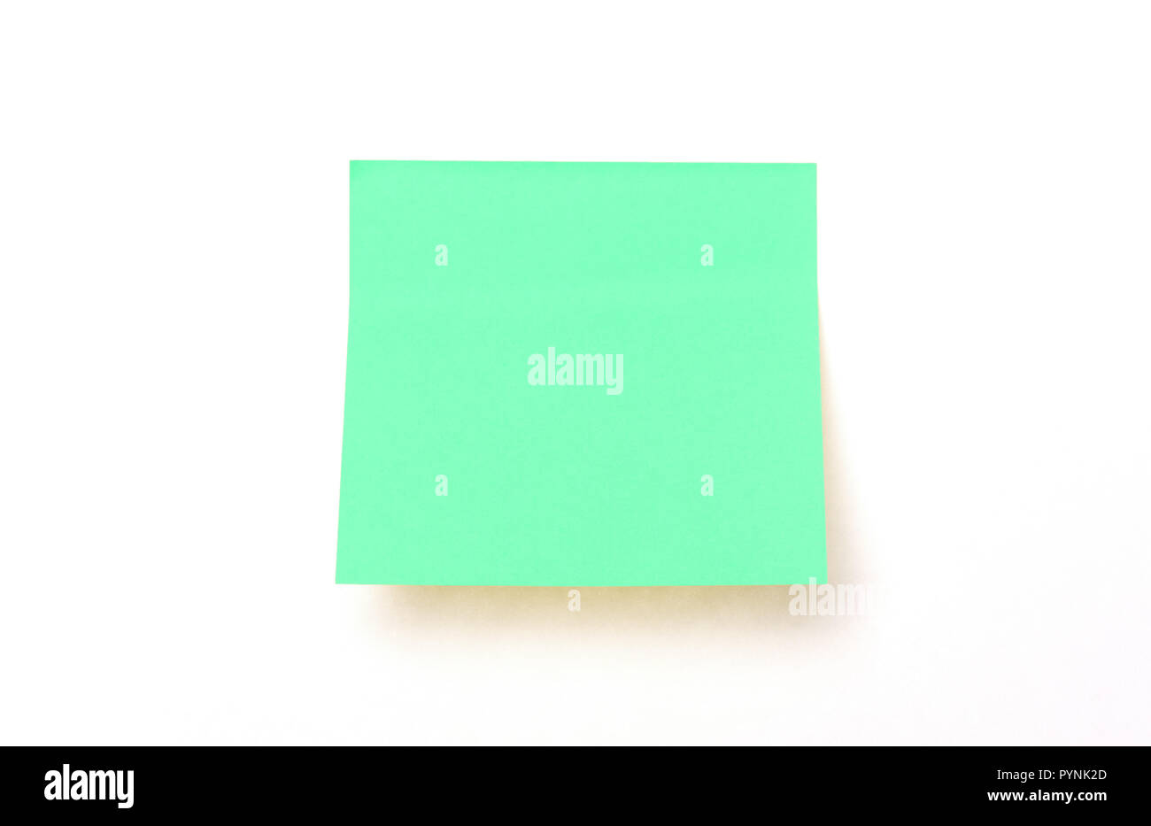 Green sticky note isolated on a white background Stock Photo - Alamy