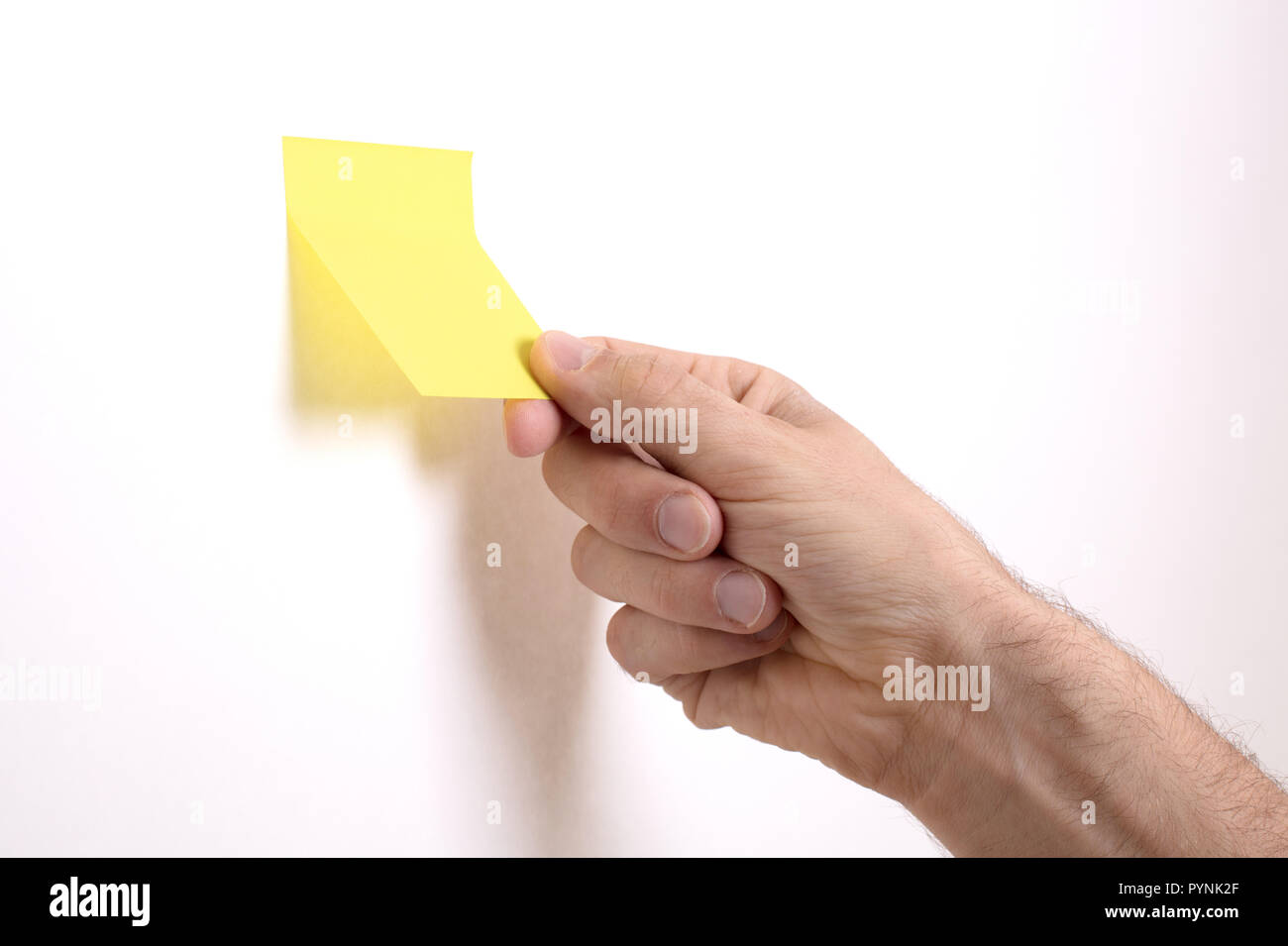 Yellow sticky note isolated on a white background Stock Photo - Alamy