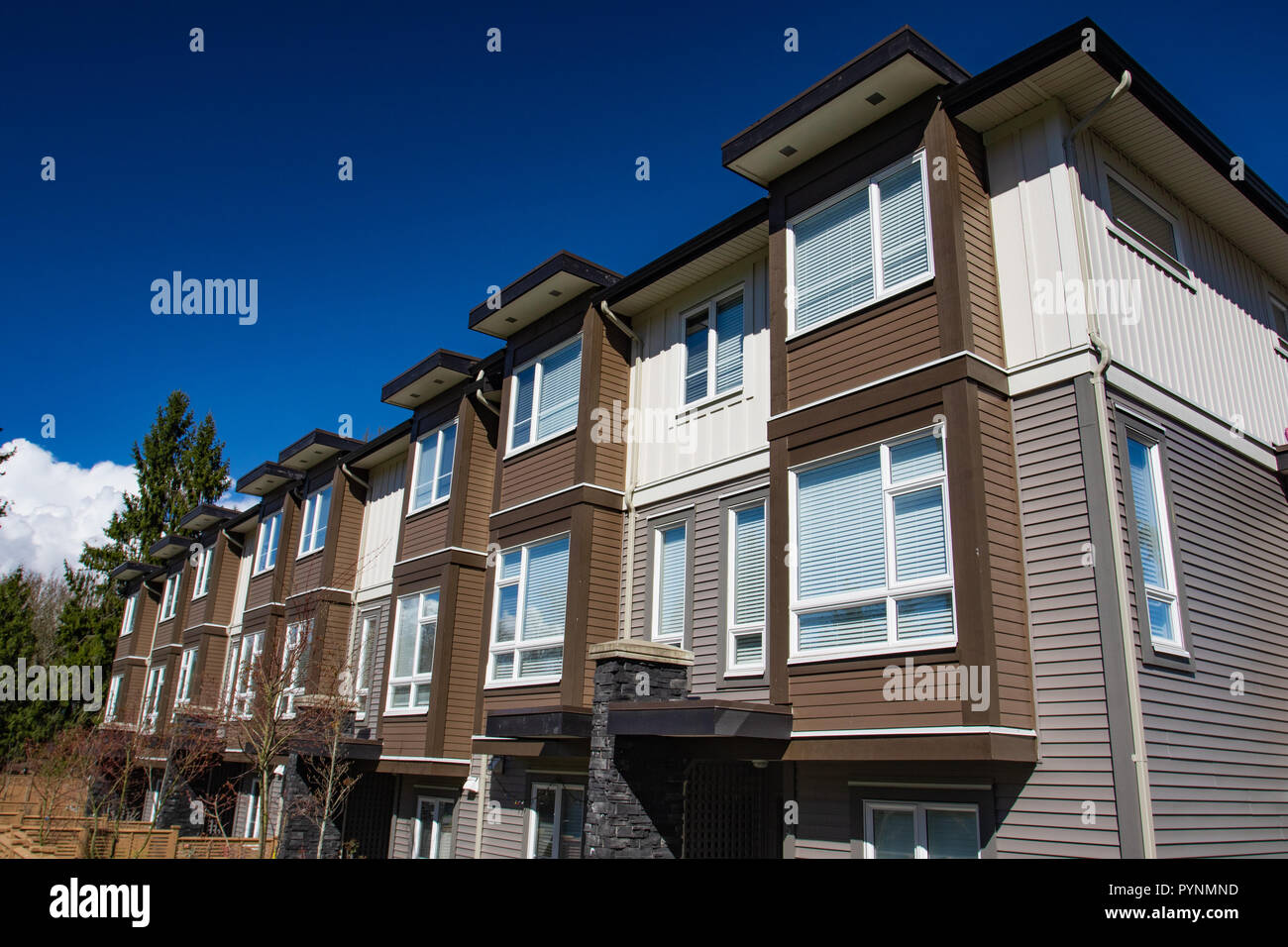 Modern low rise wood frame complex. Brand new apartment building on ...