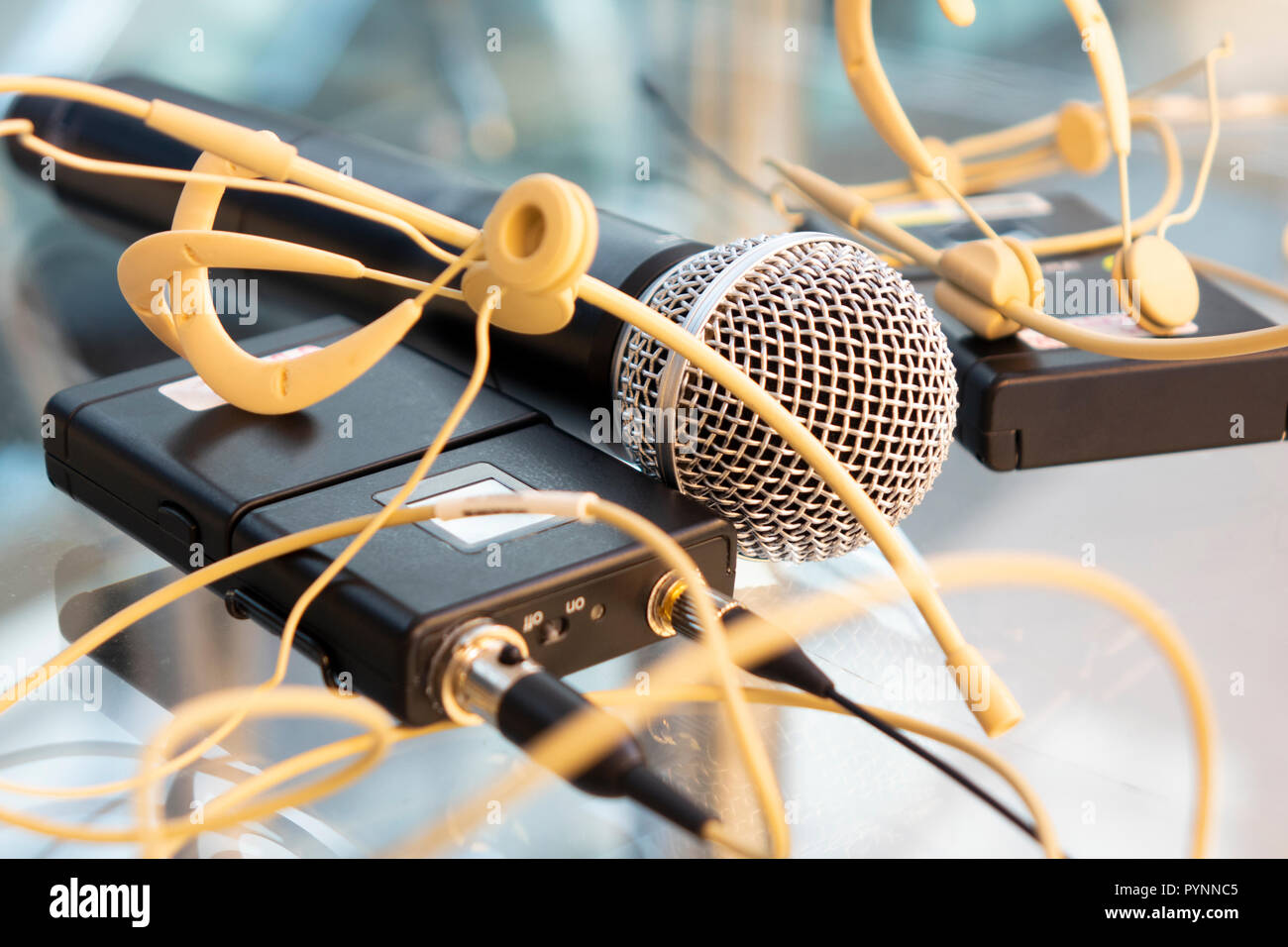 Two head set wireless microphones transmitter and hand microphone ...