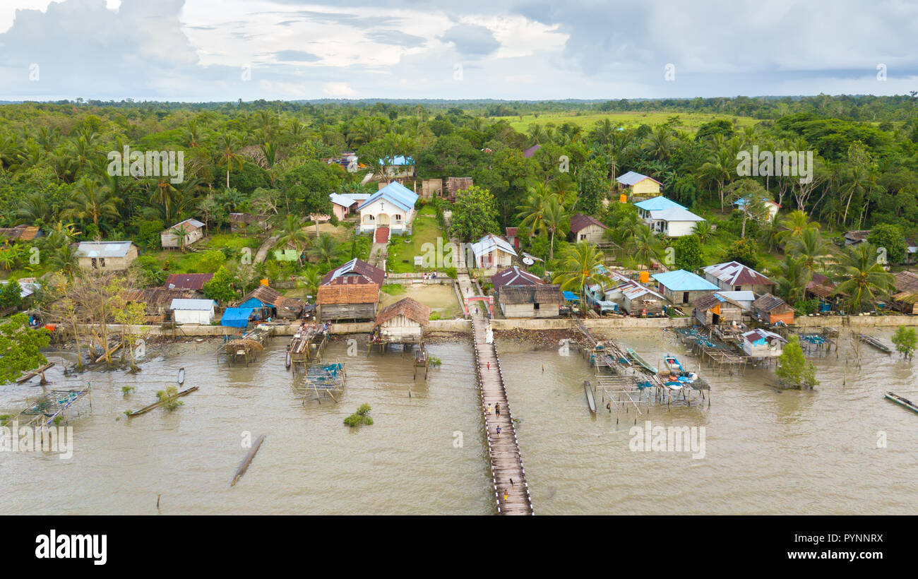 Aerial shot of the isolated village of Tungu in the Aru islands ...