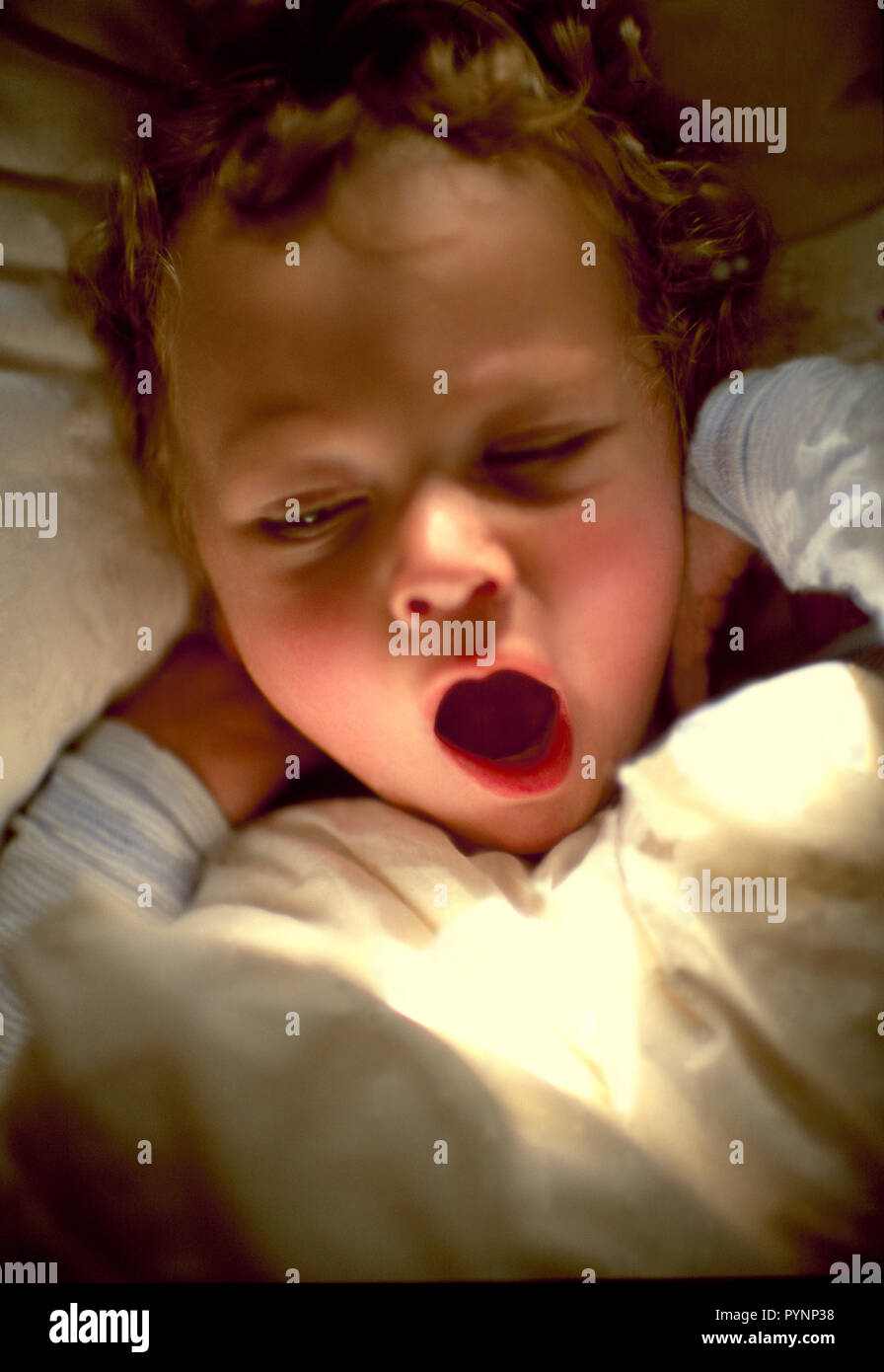 Tired little boy at bedtime Stock Photo - Alamy