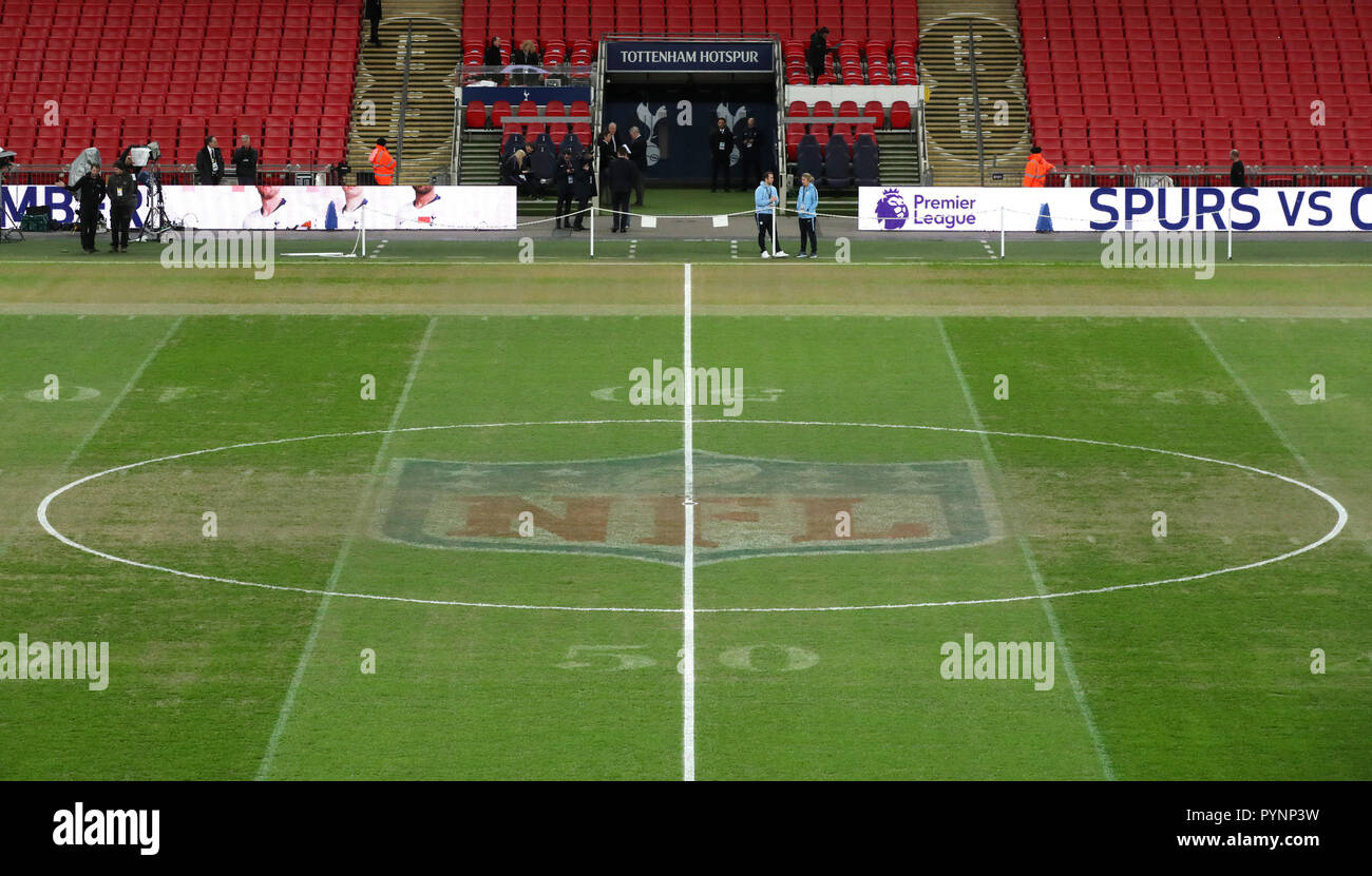 NFL markings still visible on the pitch before the Premier League match ...