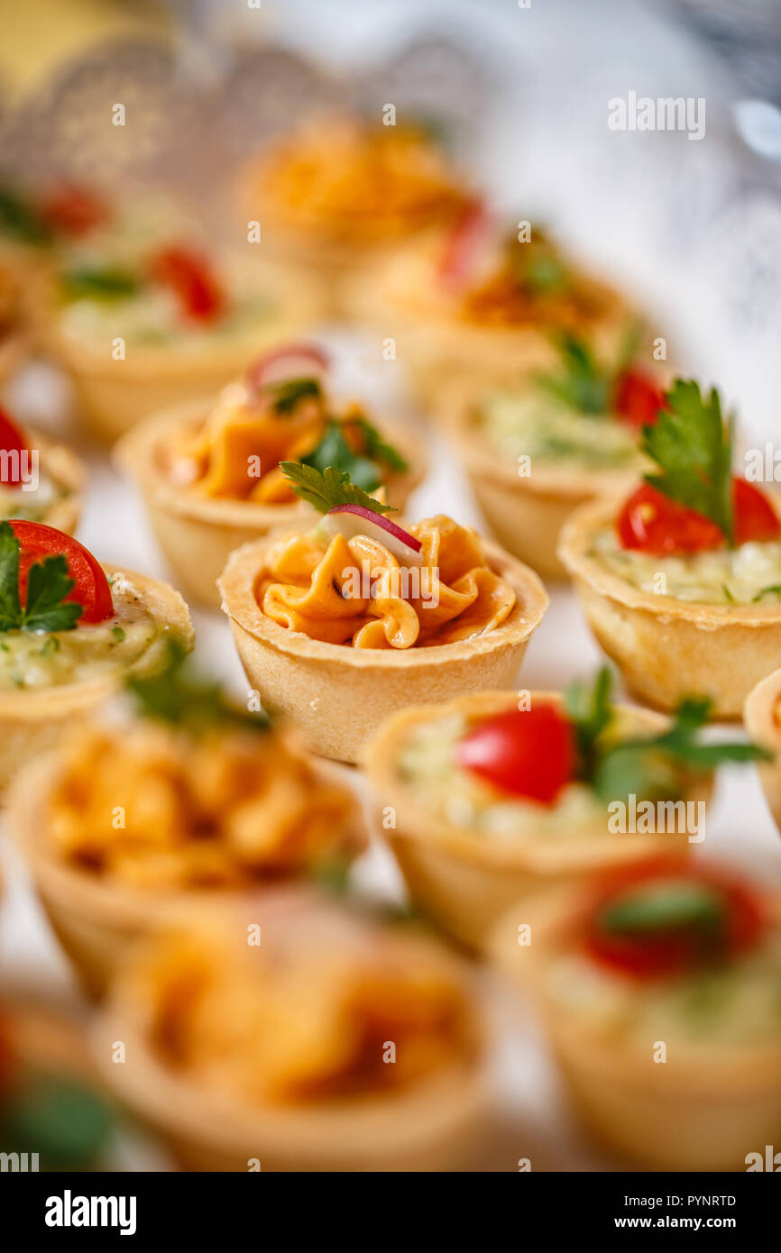 Tartlets with spiced cheese, gourmet appetizer food Stock Photo - Alamy