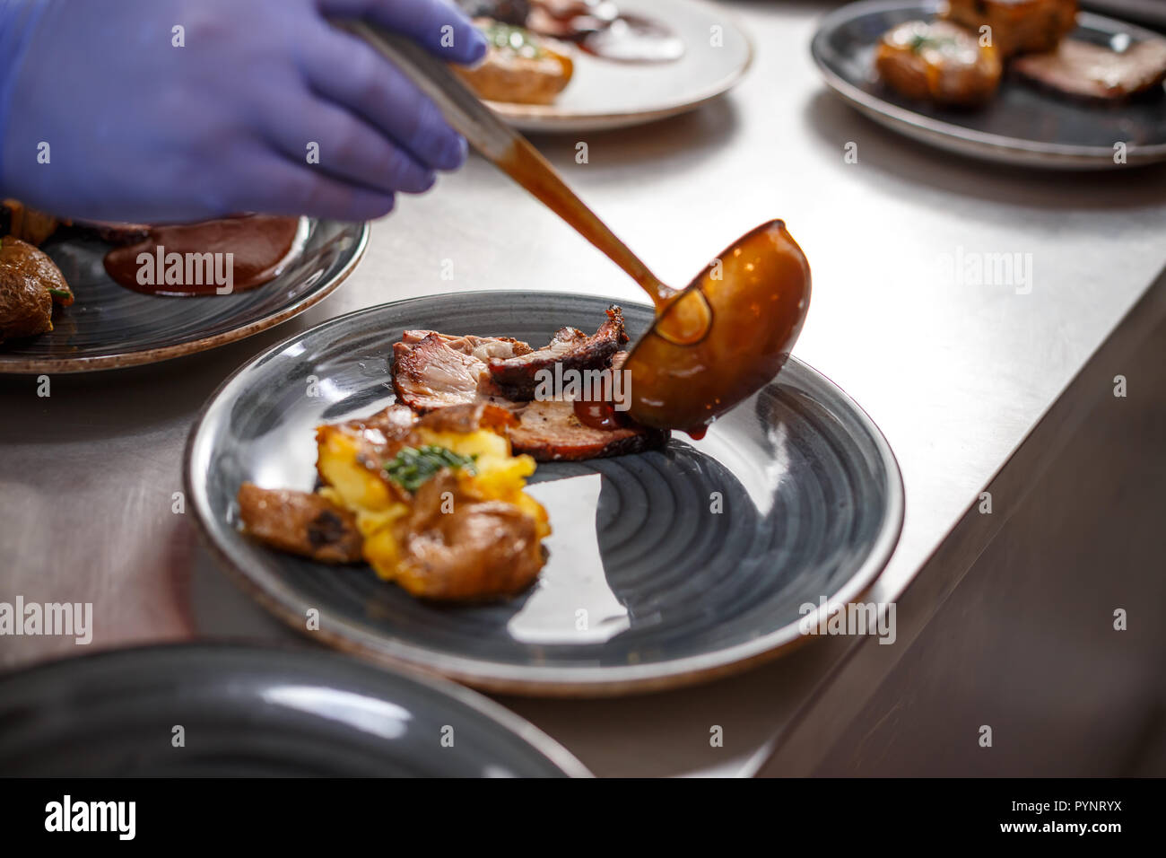 Pouring sauce hi-res stock photography and images - Alamy