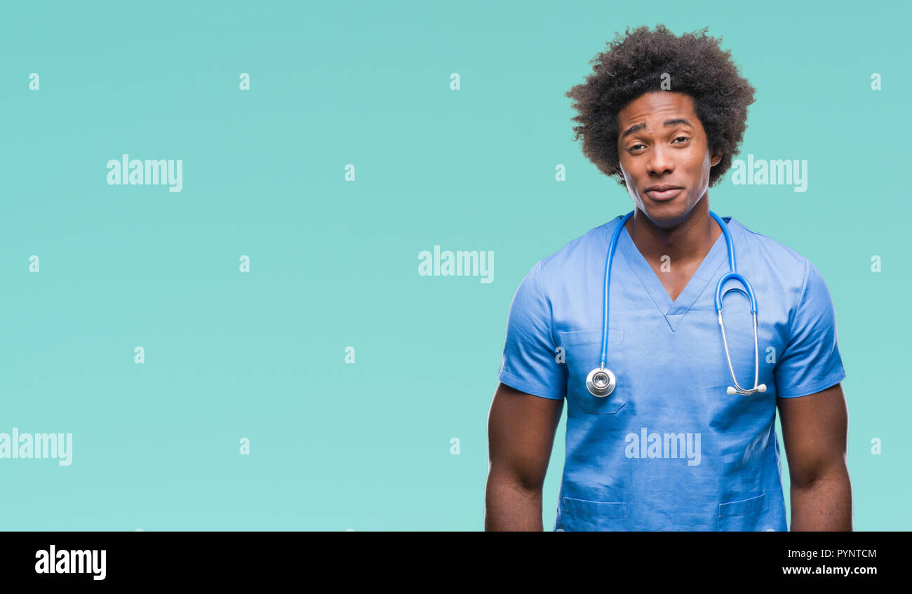 Afro american surgeon doctor man over isolated background depressed and ...