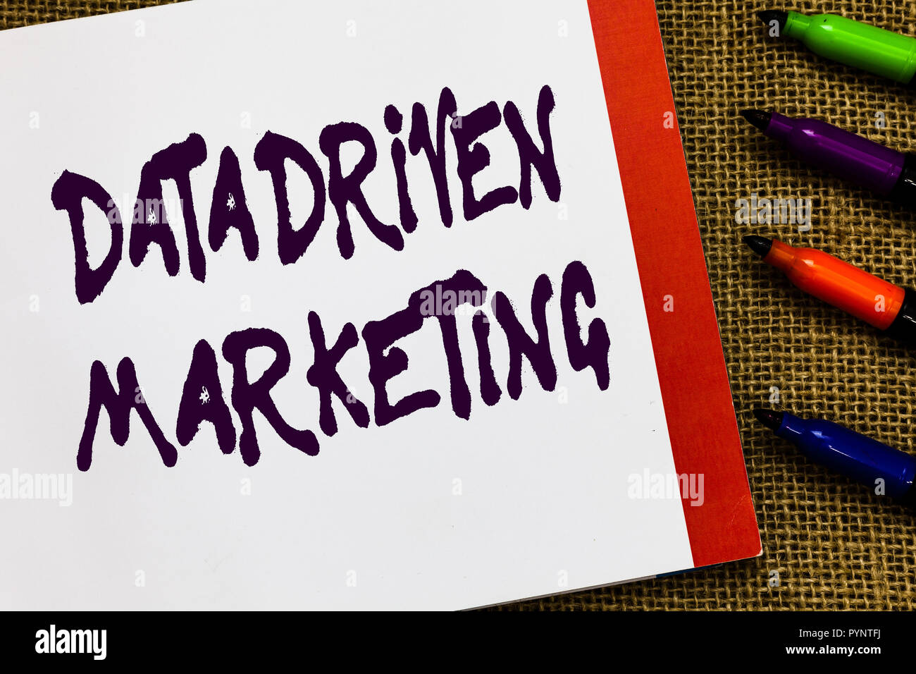 Handwriting text Data Driven Marketing. Concept meaning Strategy built ...