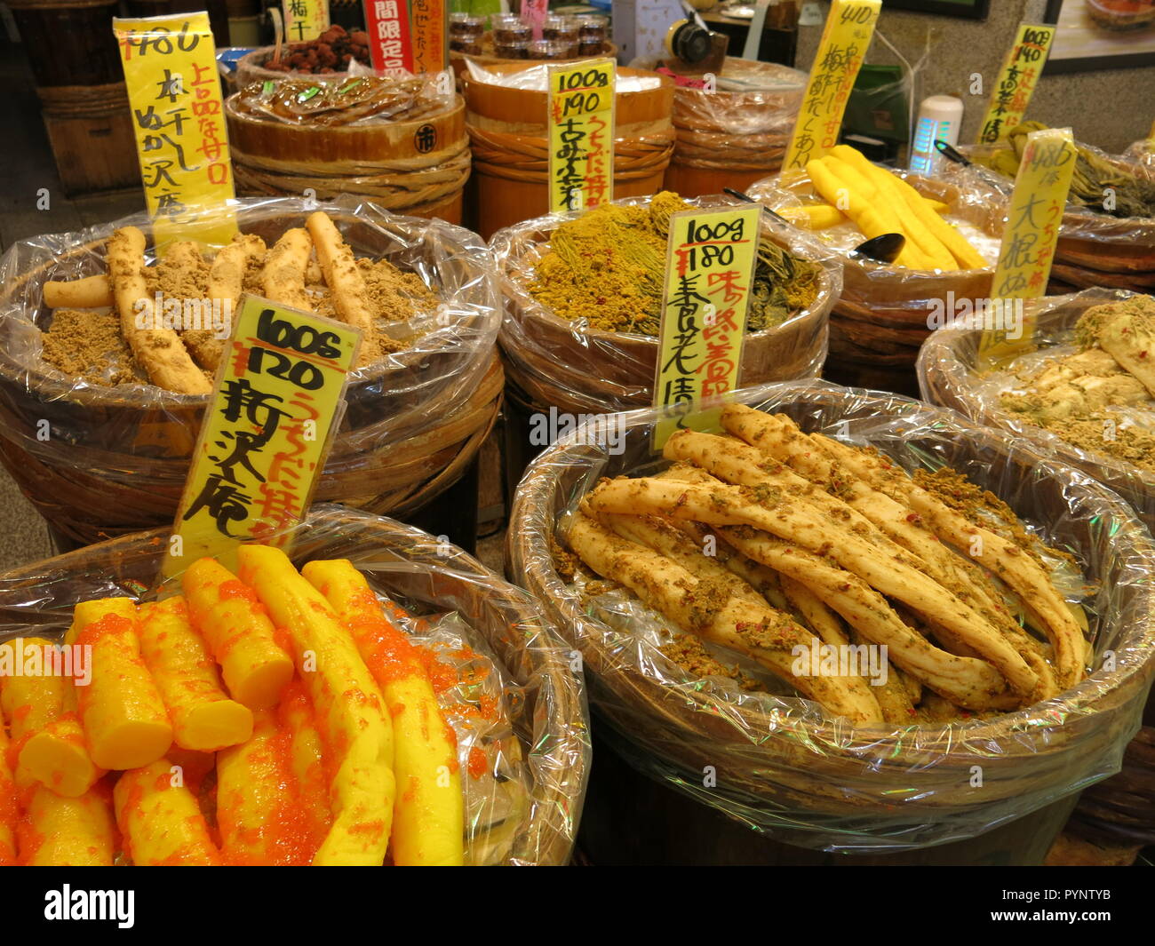 A stall on Nishiki Street, the covered food market in Kyoto, selling ...