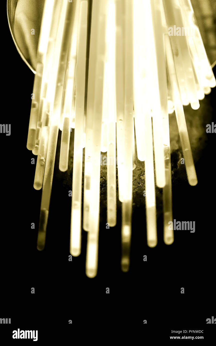 Desatured effect fluorescent chem light neon tube with reflection on ...