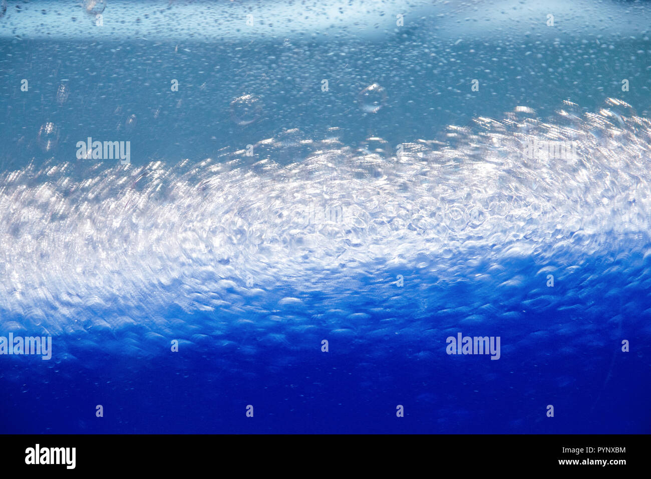 Abstract background and texture of blue bubbles with backlight Stock ...