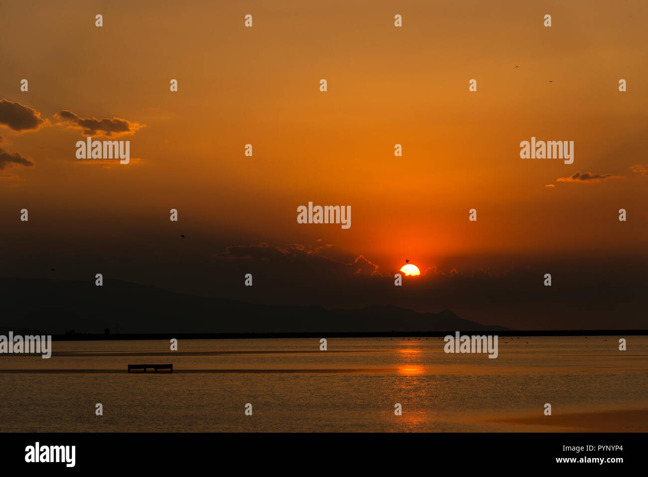 Sunset landscape with sea Stock Photo - Alamy