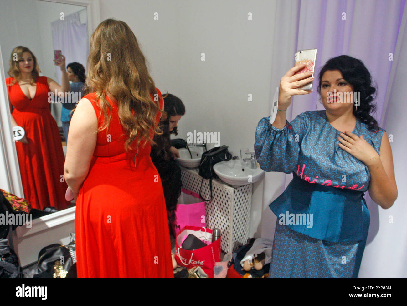 Contestants seen posing for selfies backstage during the "Miss Ukraine ...
