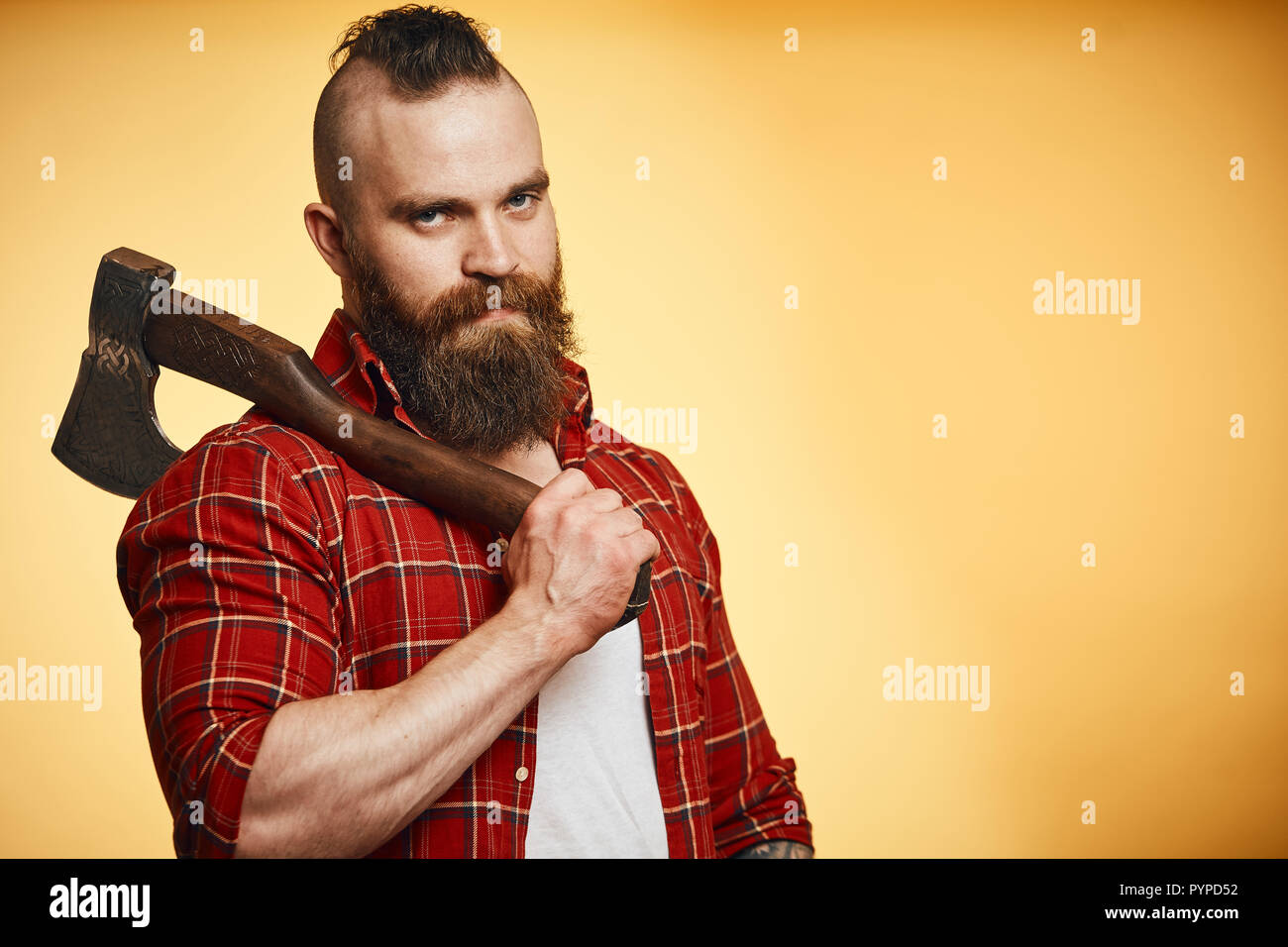 Man carrying an axe on his shoulder hi-res stock photography and images ...